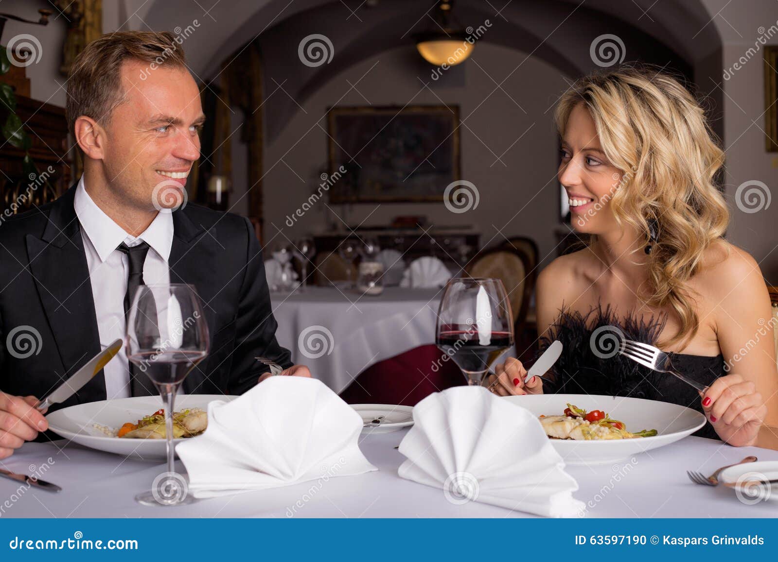 Couple Having Dinner in Restaurant Stock Photo - Image of girl, newyear ...