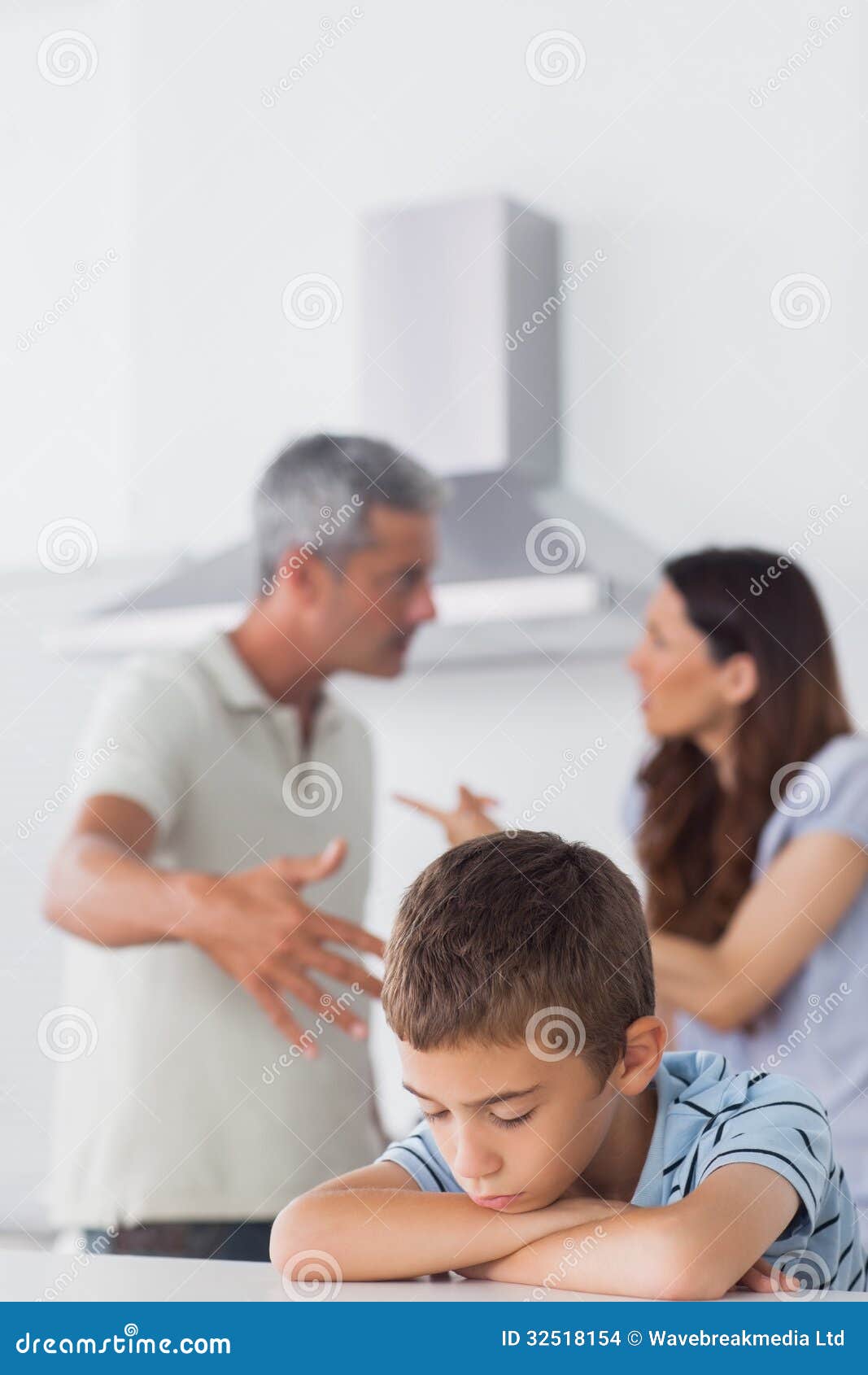 Couple Having Dispute in Front of Their Sad Son Stock Photo - Image of ...