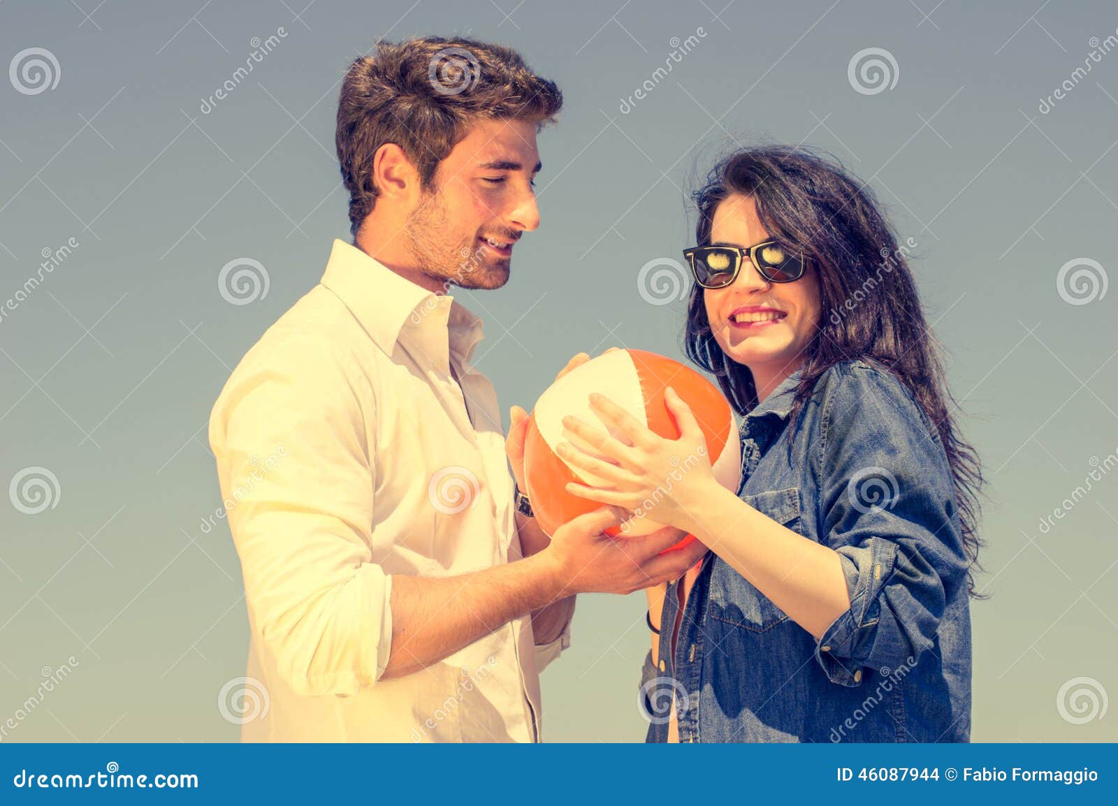 Couple Having Fun with a Beach Ball Stock Photo - Image of honeymoon ...