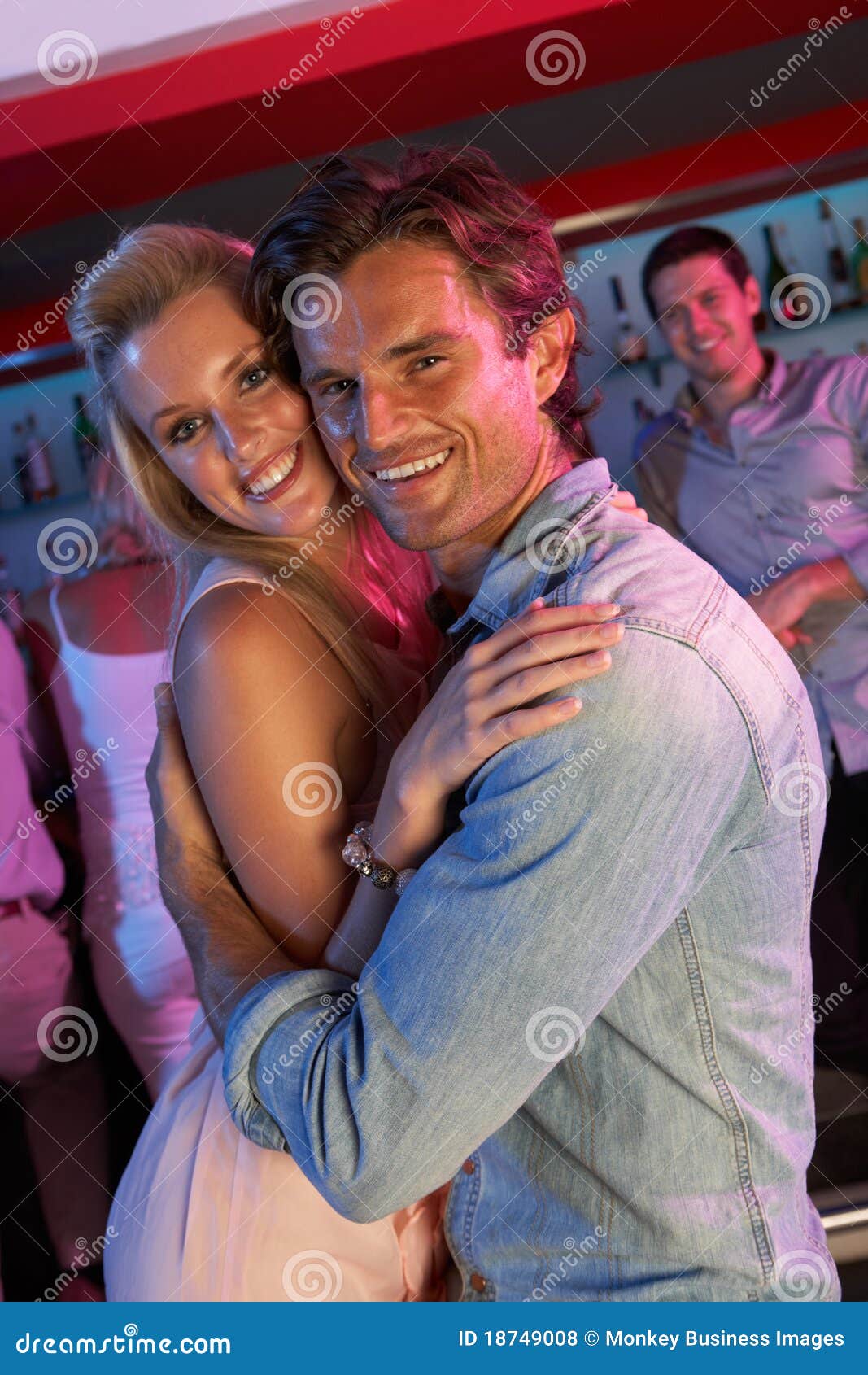 Couple Having Fun in Busy Bar Stock Photo - Image of female ...