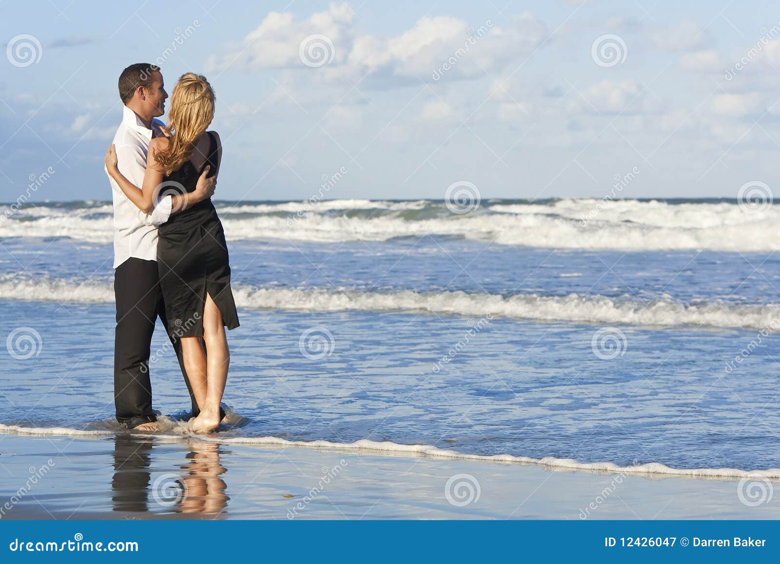 Couple Having Fun Embracing on a Beach Stock Image - Image of married ...