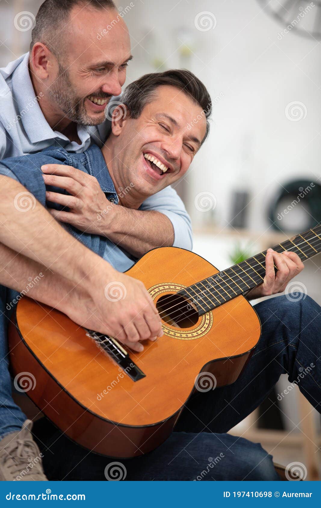 Couple Having Fun with Guitars Stock Photo - Image of black, cheerful ...