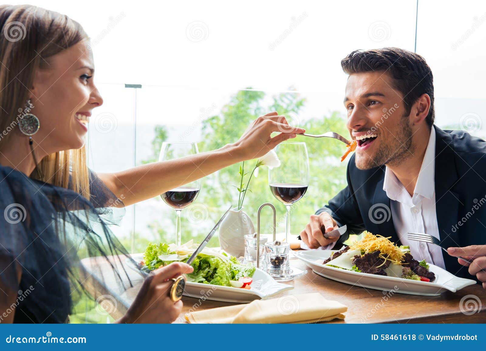 Couple Having Lunch In Restaurant Stock Photo - Image: 58461618