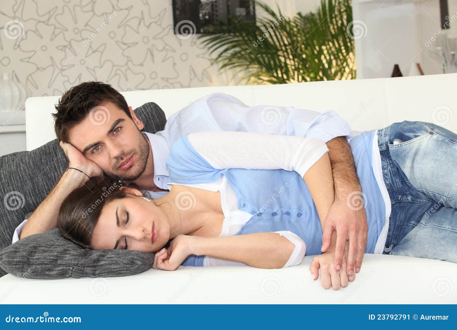 Couple having nap stock image. Image of forties, living - 23792791