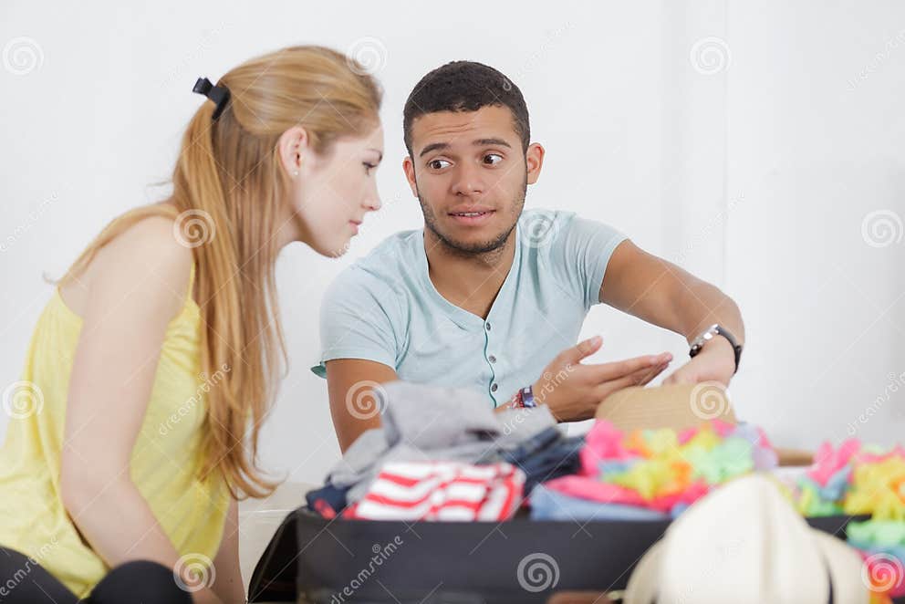 Couple Having Packing Problems Stock Image - Image of relaxed ...