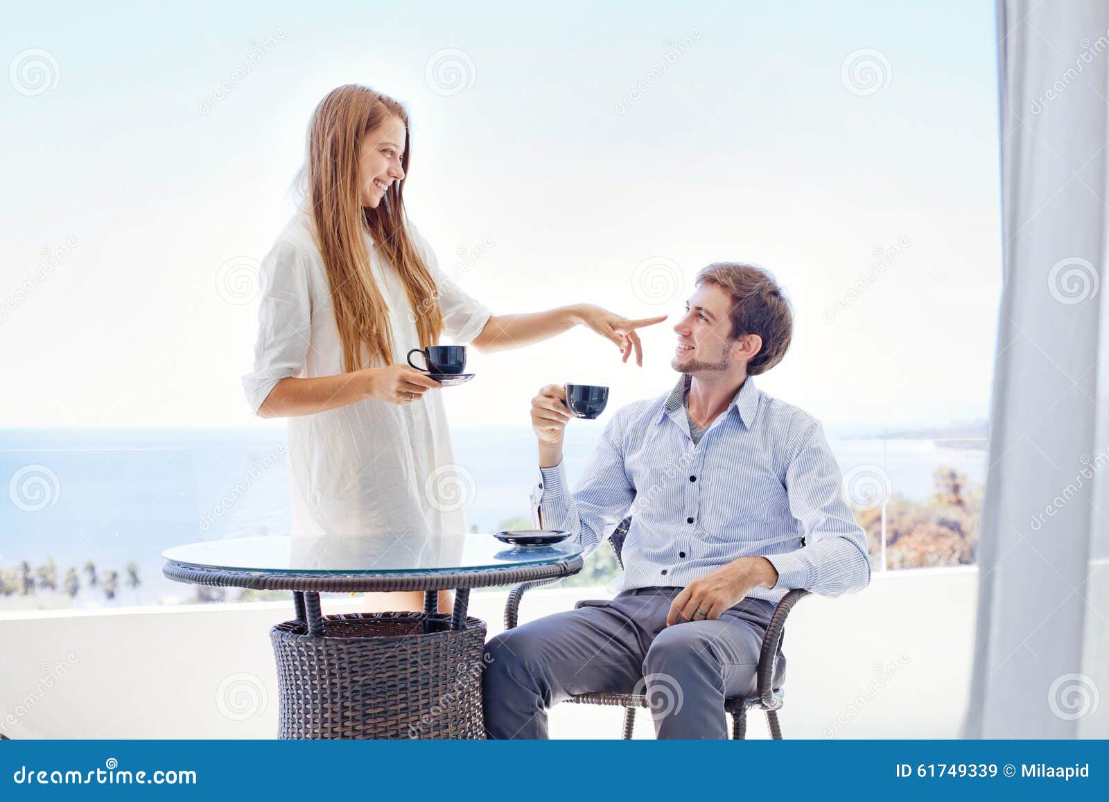 Couple Having Tea at the Balcony Stock Image - Image of outdoors ...