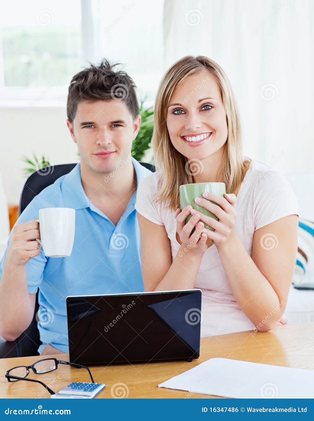 Couple having tea break stock photo. Image of drinking - 16347486
