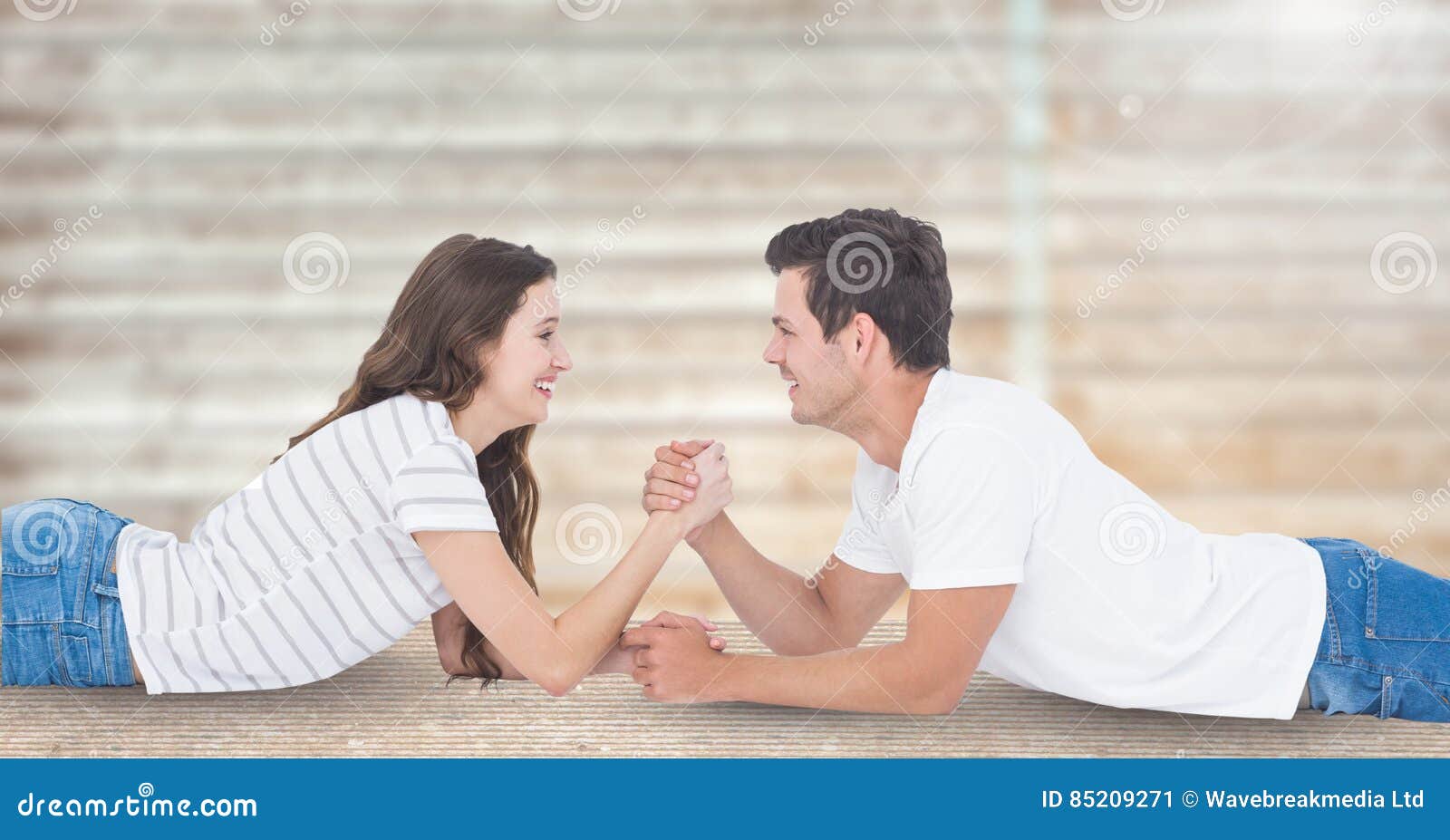 Couple having wrist fight stock image. Image of floor - 85209271