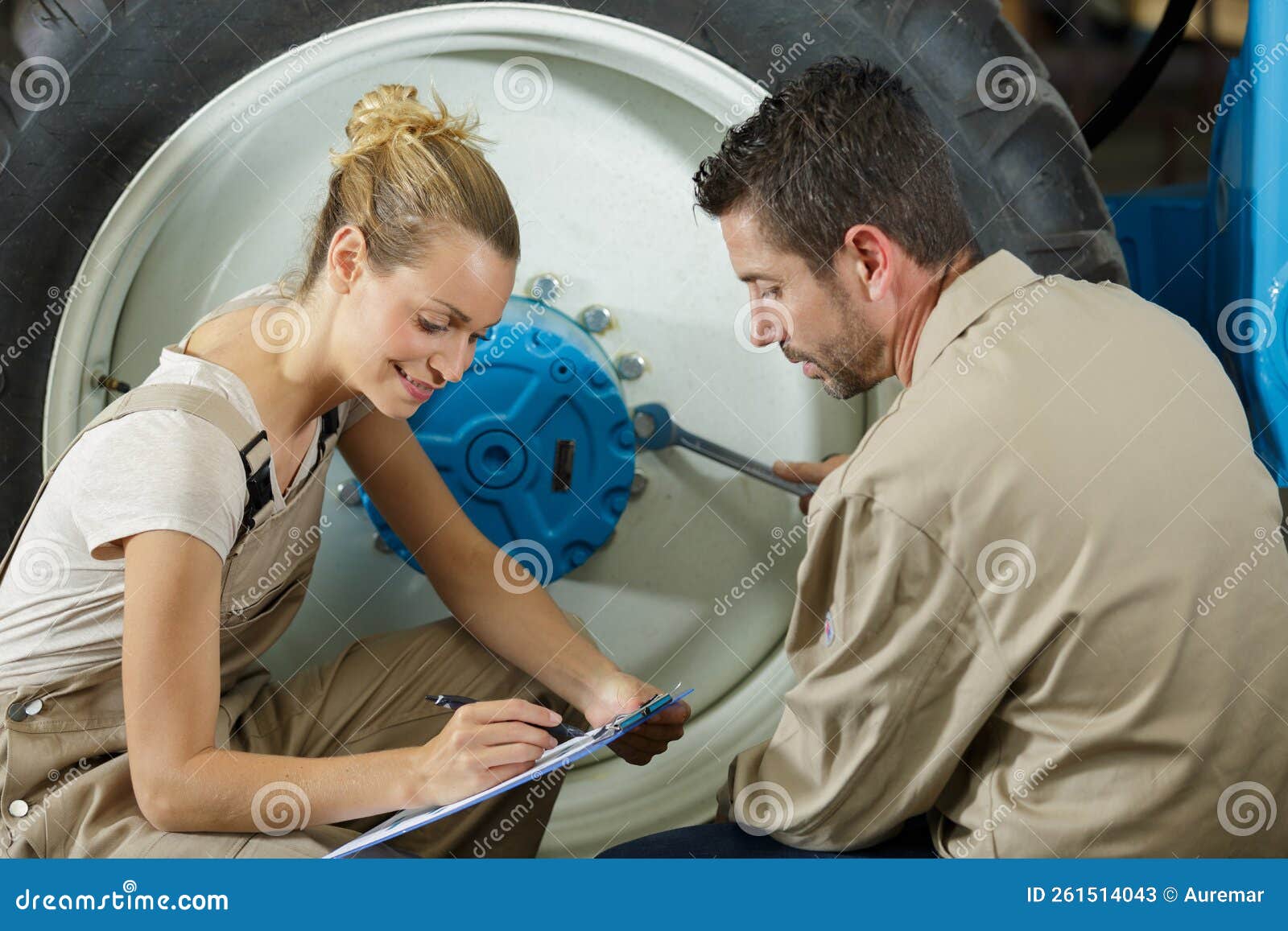 Couple Heavy Equipment Mechanics Stock Image - Image of automotive ...