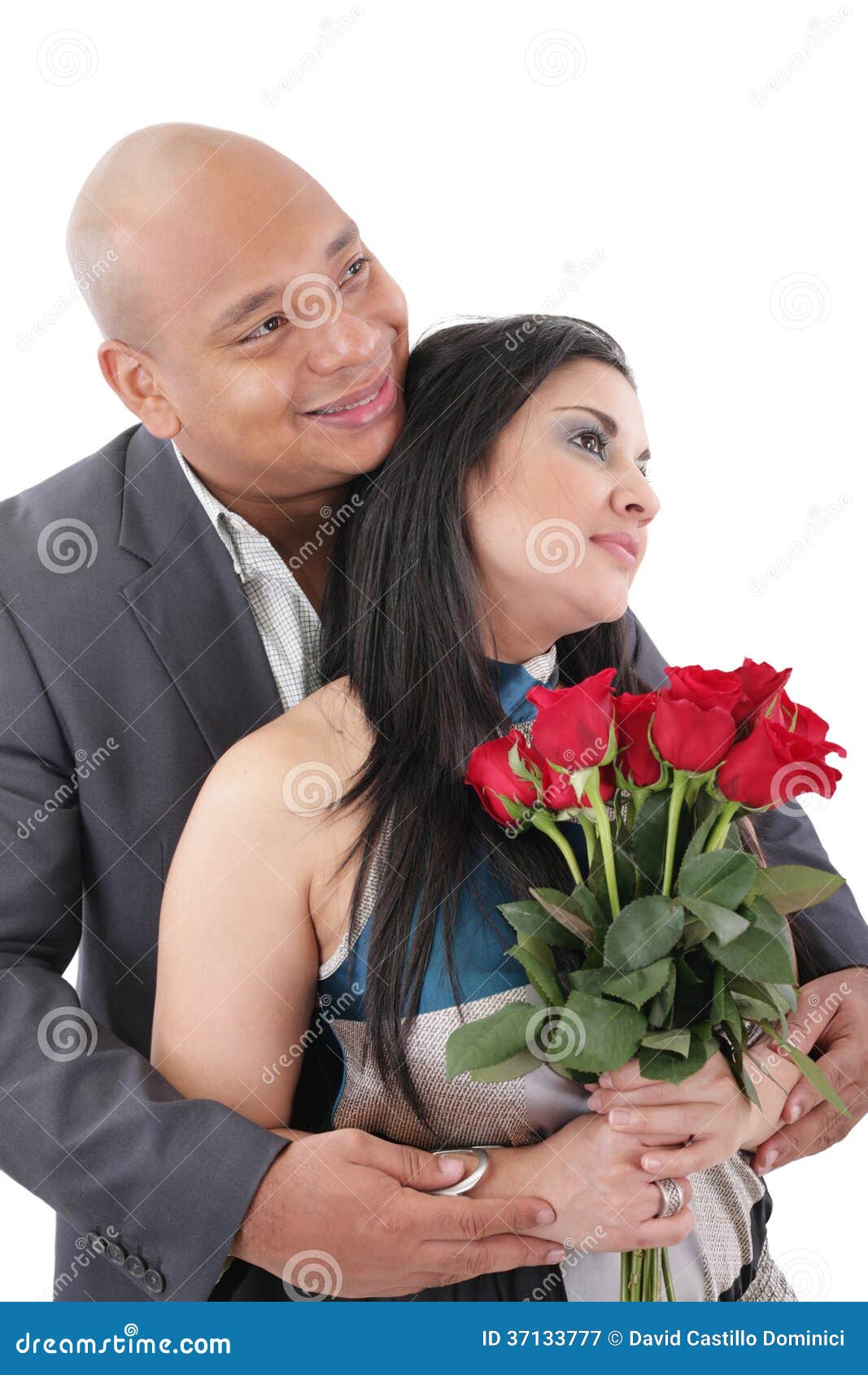 Couple Holding a Bouquet of Red Roses Looking at a Copyspace Stock ...