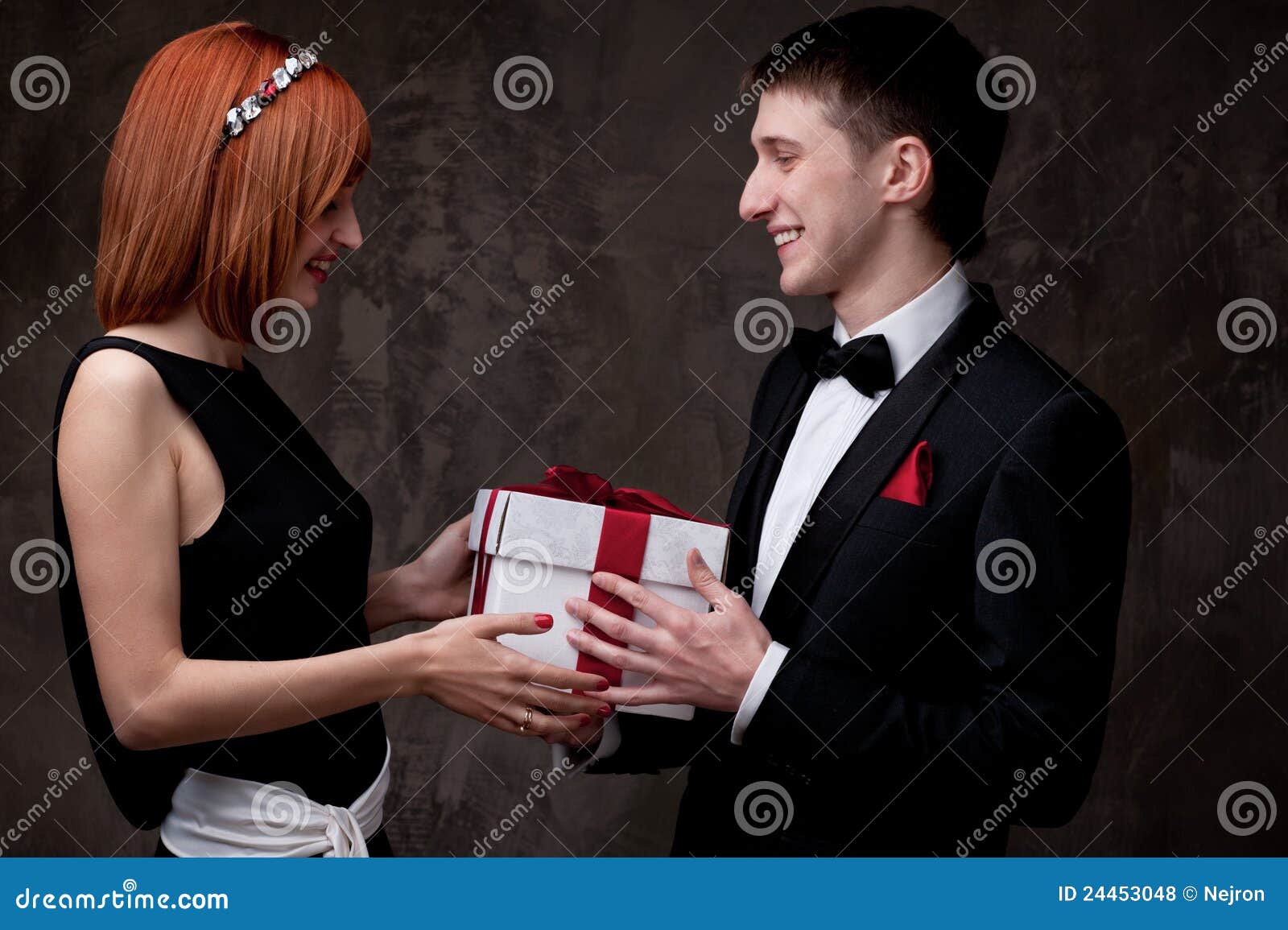 Couple Holding Gift Box Together Stock Photo - Image of girl, holiday ...