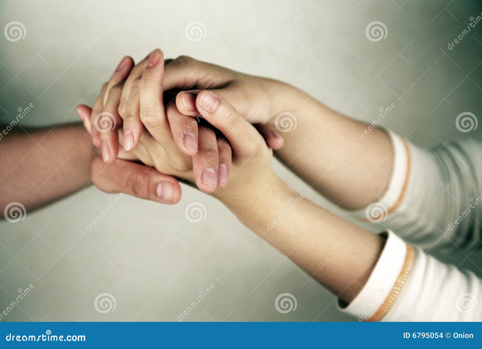 Couple holding hands stock photo. Image of clasped, hands - 6795054