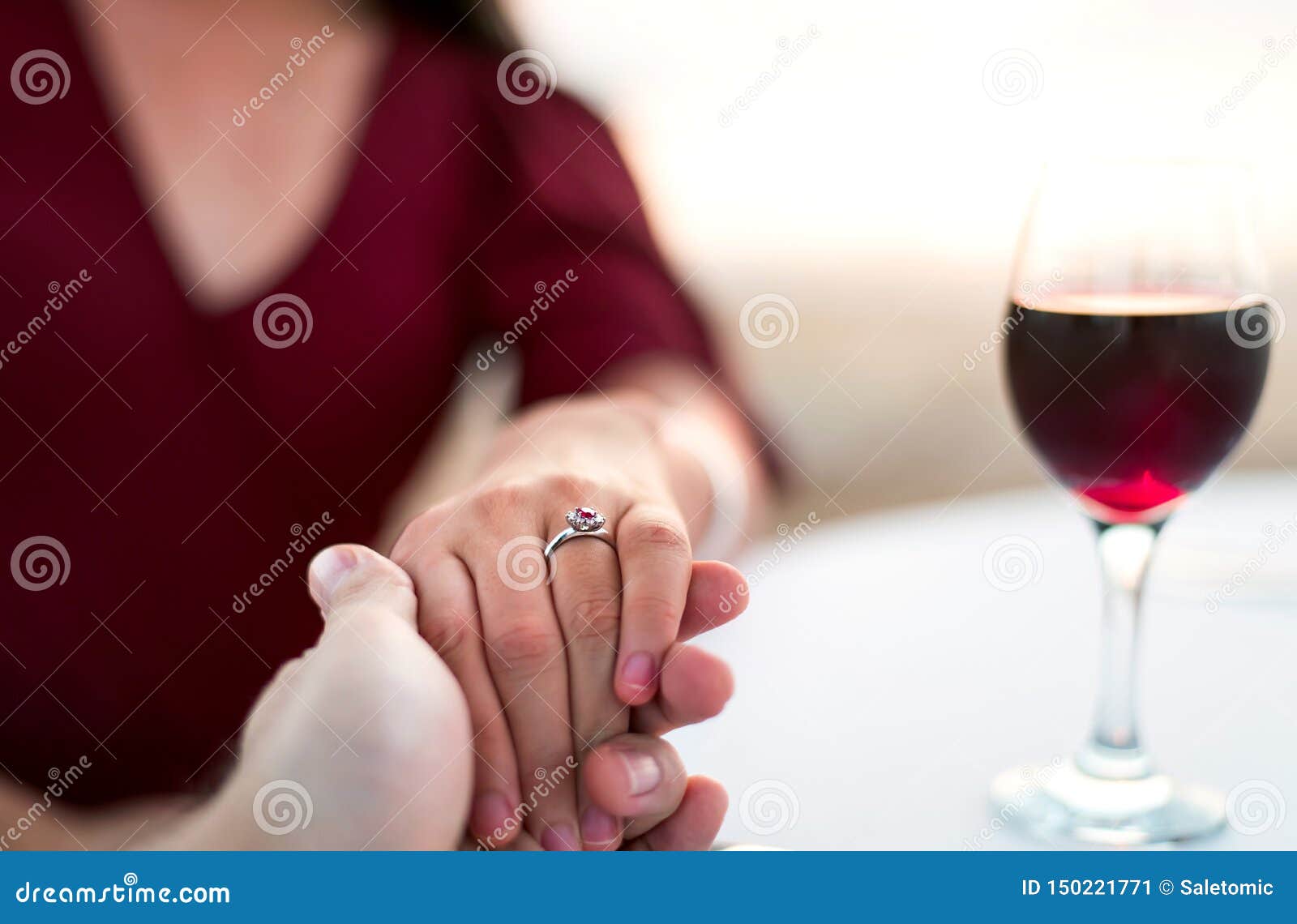 Couple Holding Hands on a Date Stock Image - Image of close, hand ...