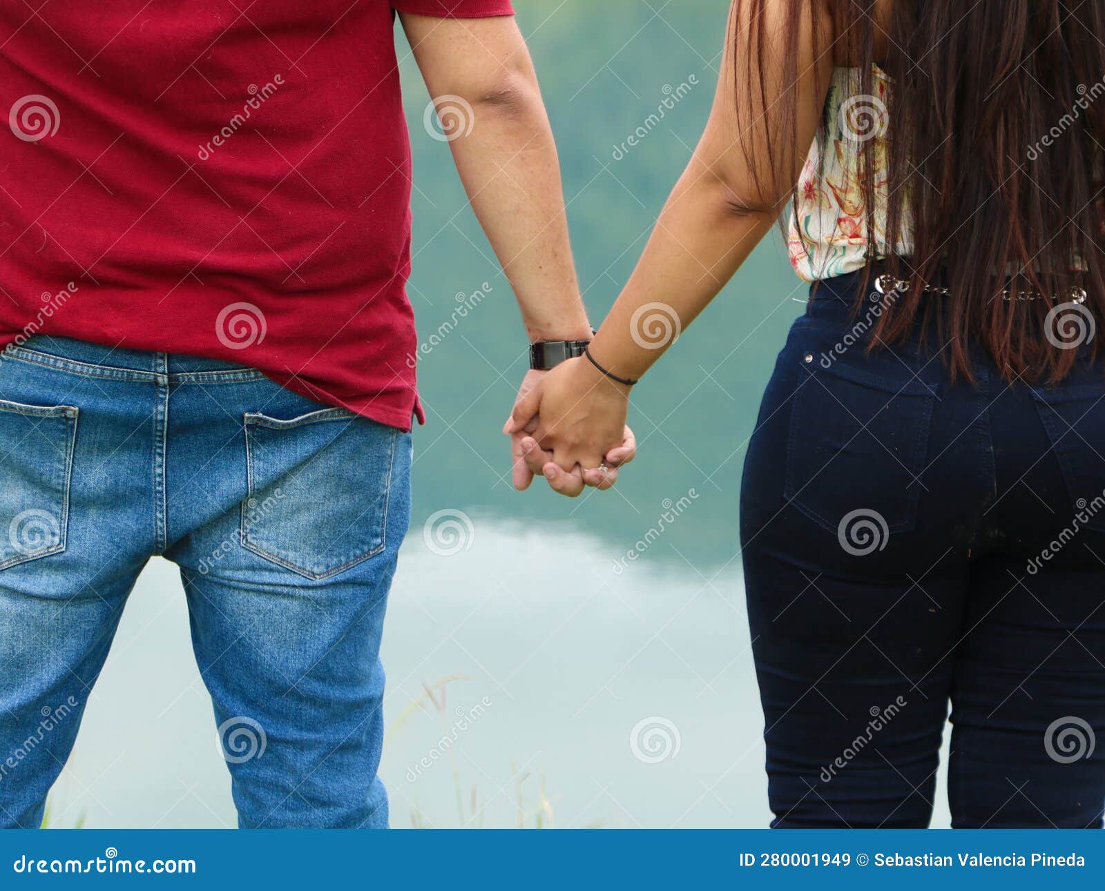 Couple Holding Hands in a Lake Stock Image - Image of marriage, emotion ...
