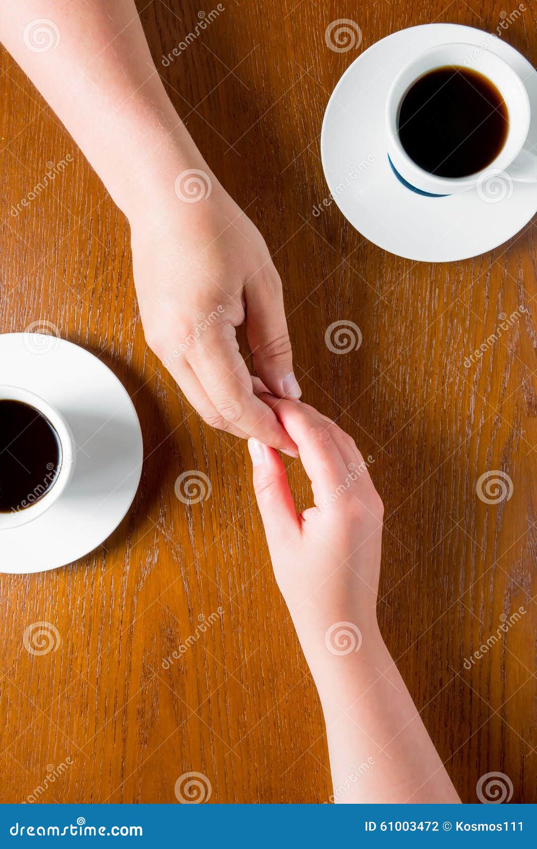 Couple Holding Hands on the Table in the Cafe Stock Photo - Image of ...