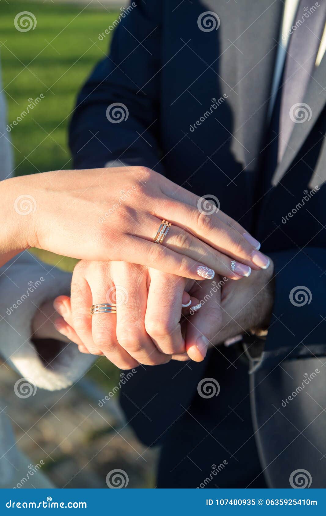 Hands with the Wedding Rings Stock Image - Image of hold, hands: 107400935