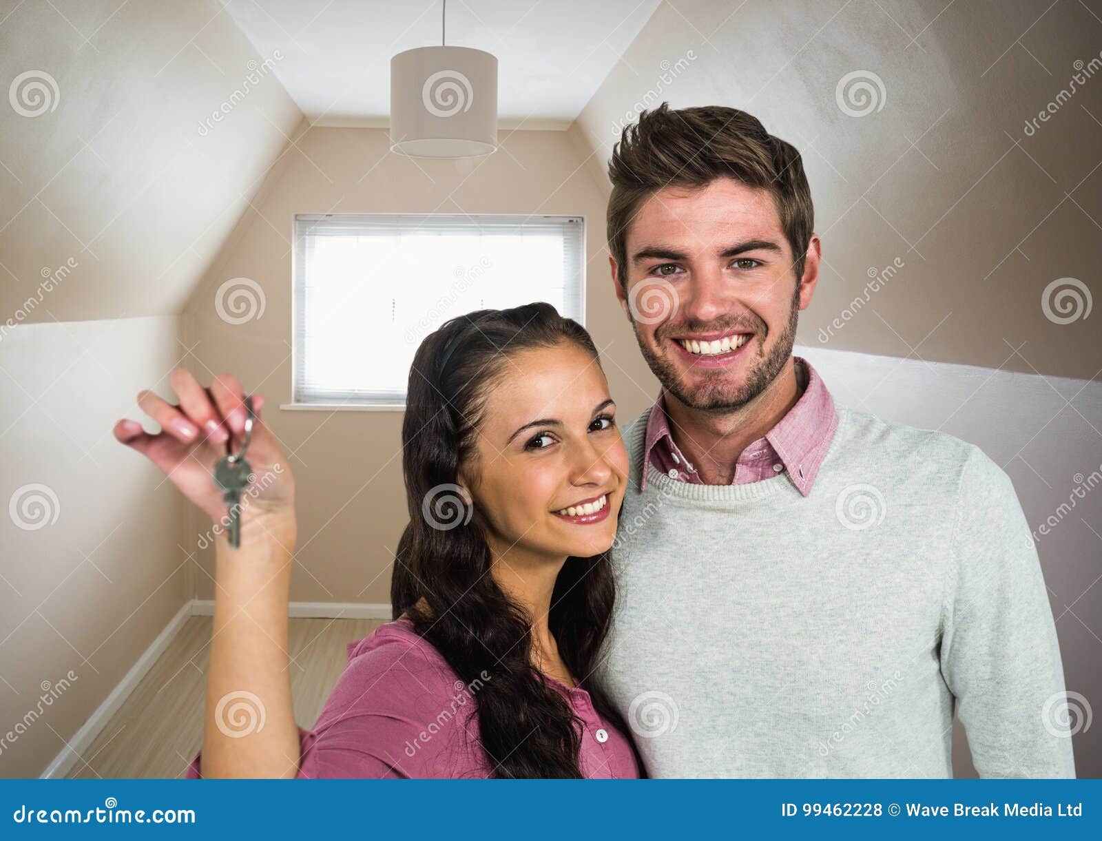 Couple Holding Key in New Home Stock Photo - Image of beige, beautiful ...