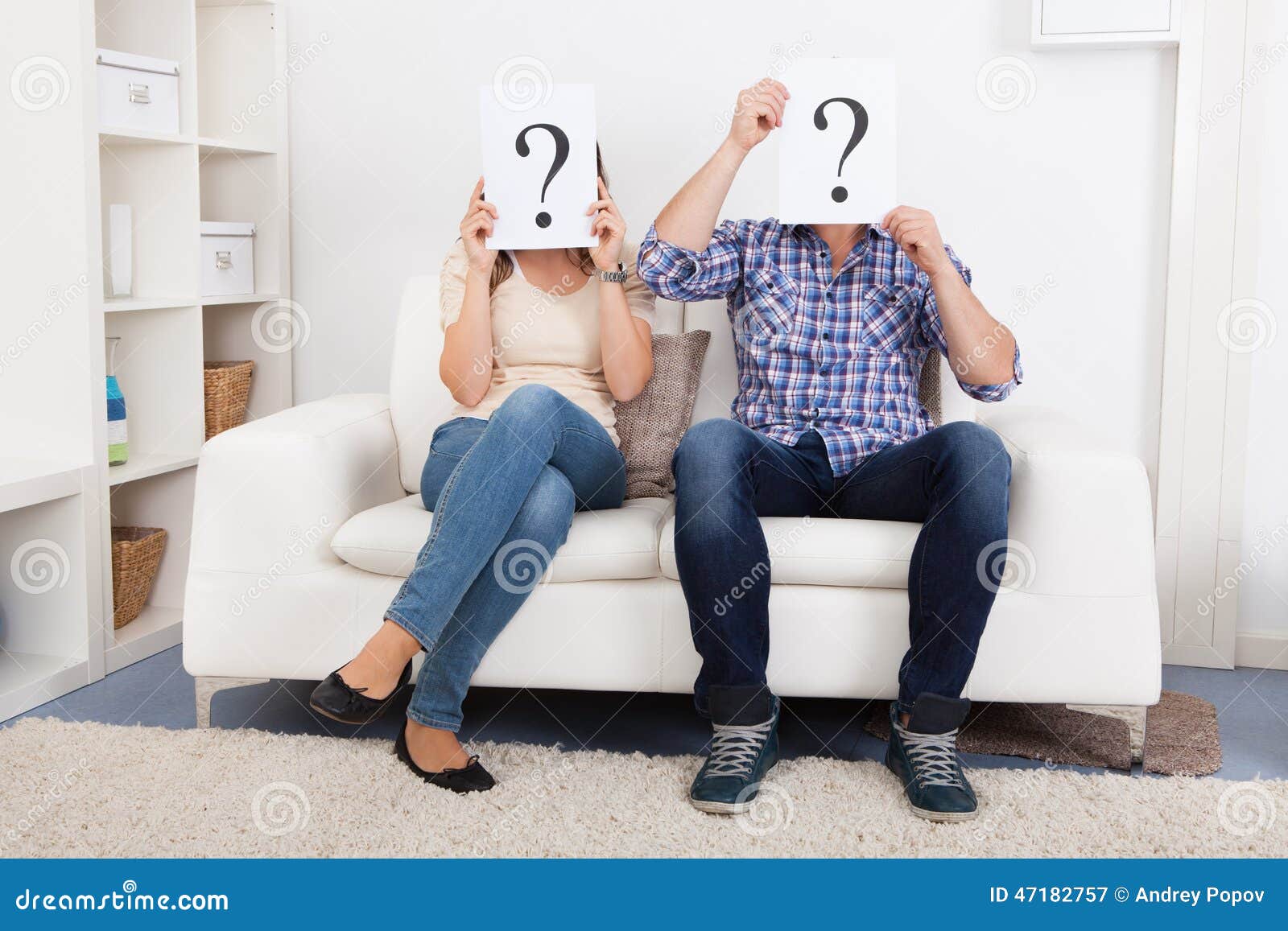 Couple Holding Question Mark Sign in Front of Face Stock Image - Image ...
