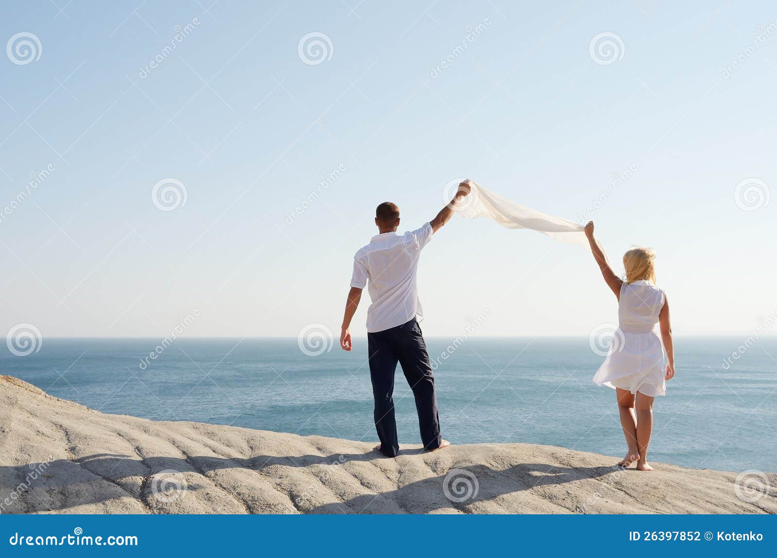 Couple Holding a White Handkerchief Stock Photo - Image of embracing ...