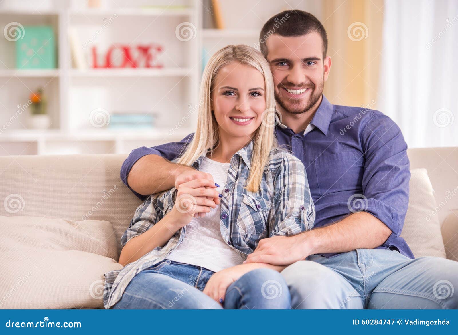 Couple at home stock image. Image of cozy, people, female - 60284747