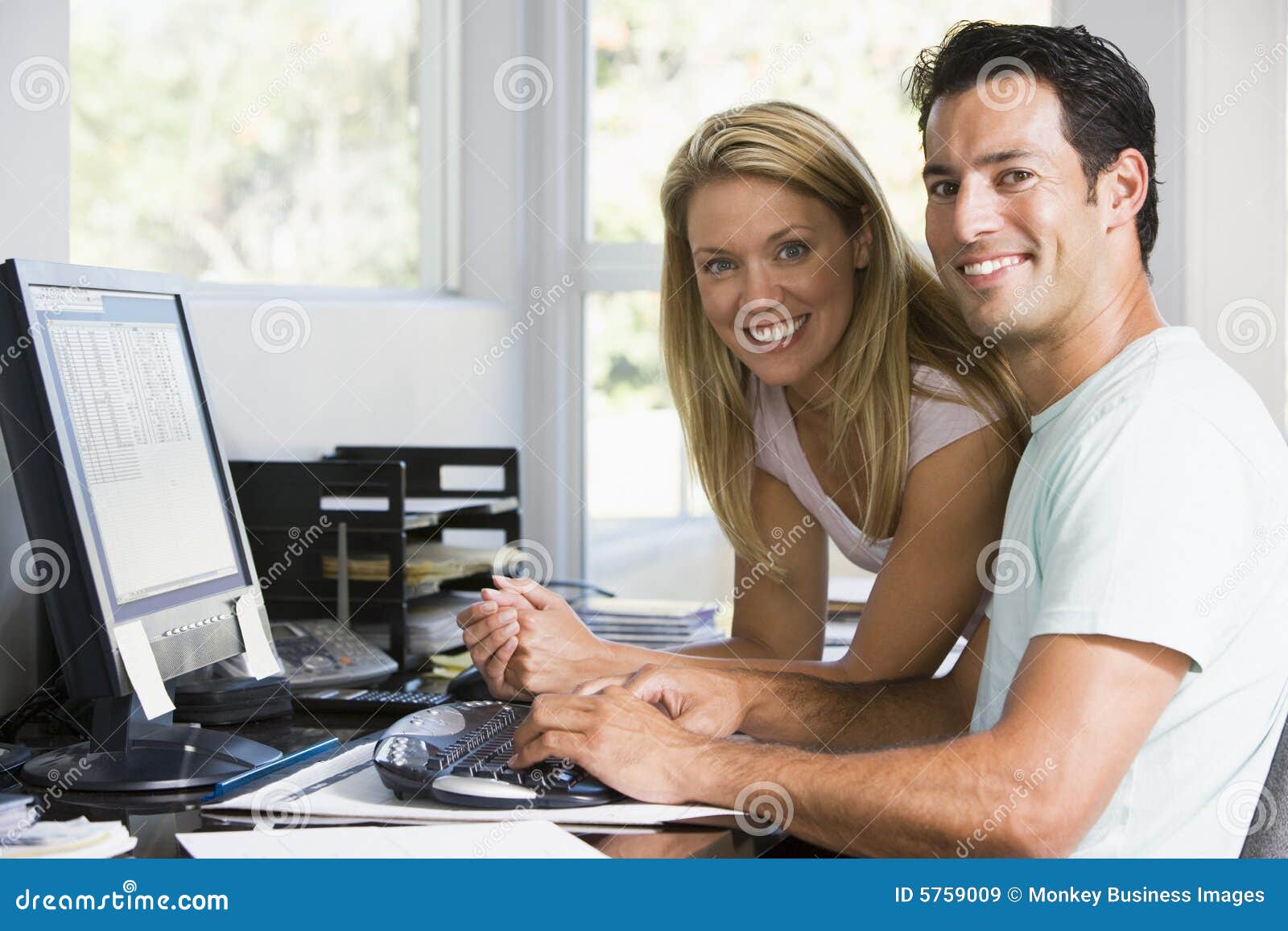 Couple in Home Office with Computer Smiling Stock Image - Image of wife ...