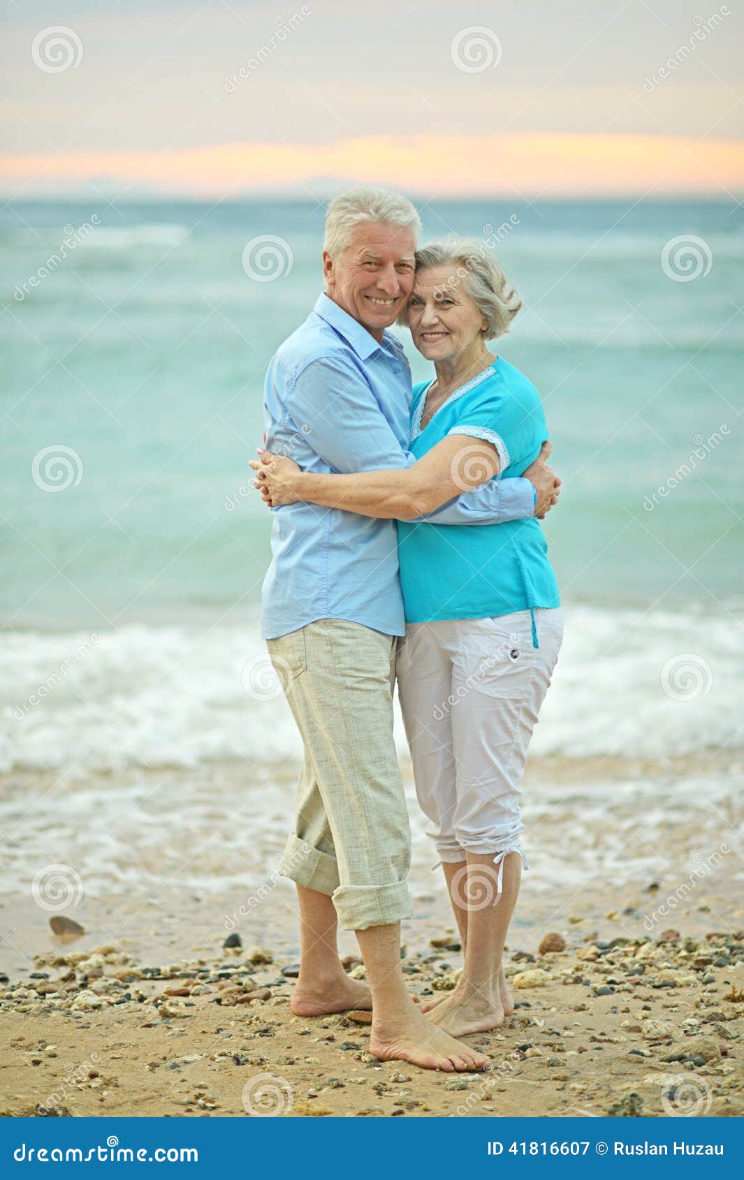 Couple hugging on beach stock image. Image of love, hugging - 41816607