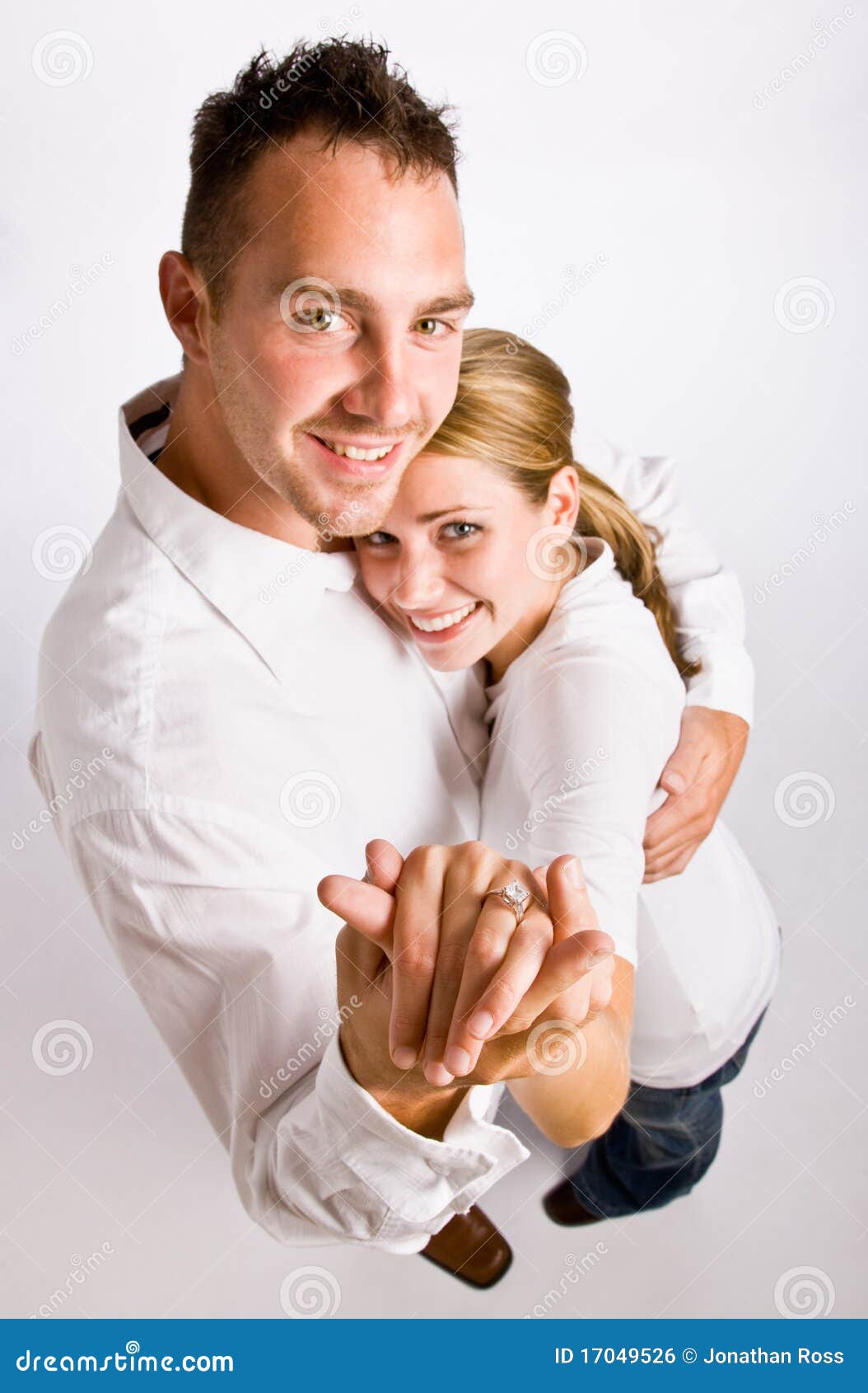 Couple Hugging and Displaying Engagement Ring Stock Photo - Image of ...