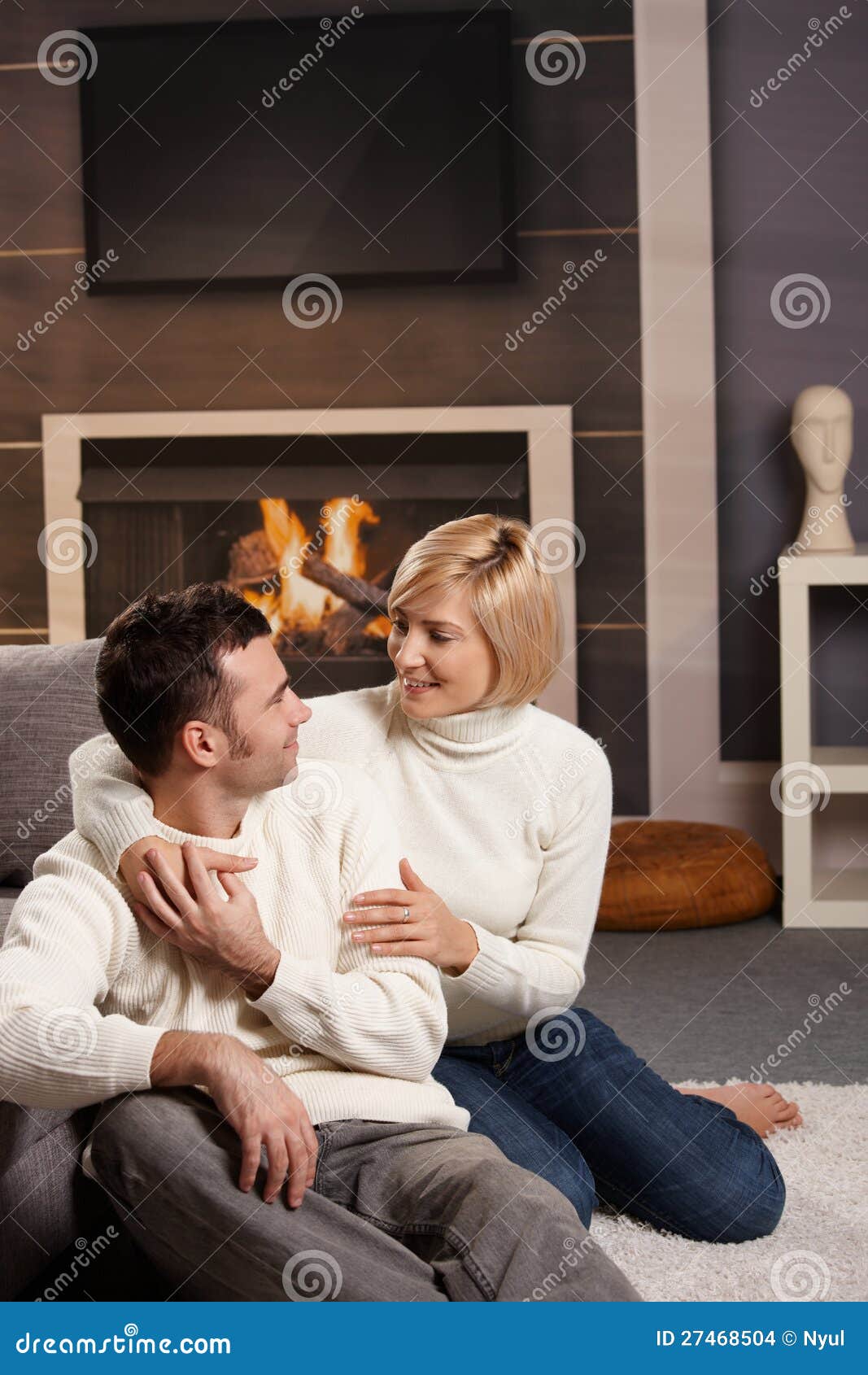 Couple hugging at home stock photo. Image of embracing - 27468504
