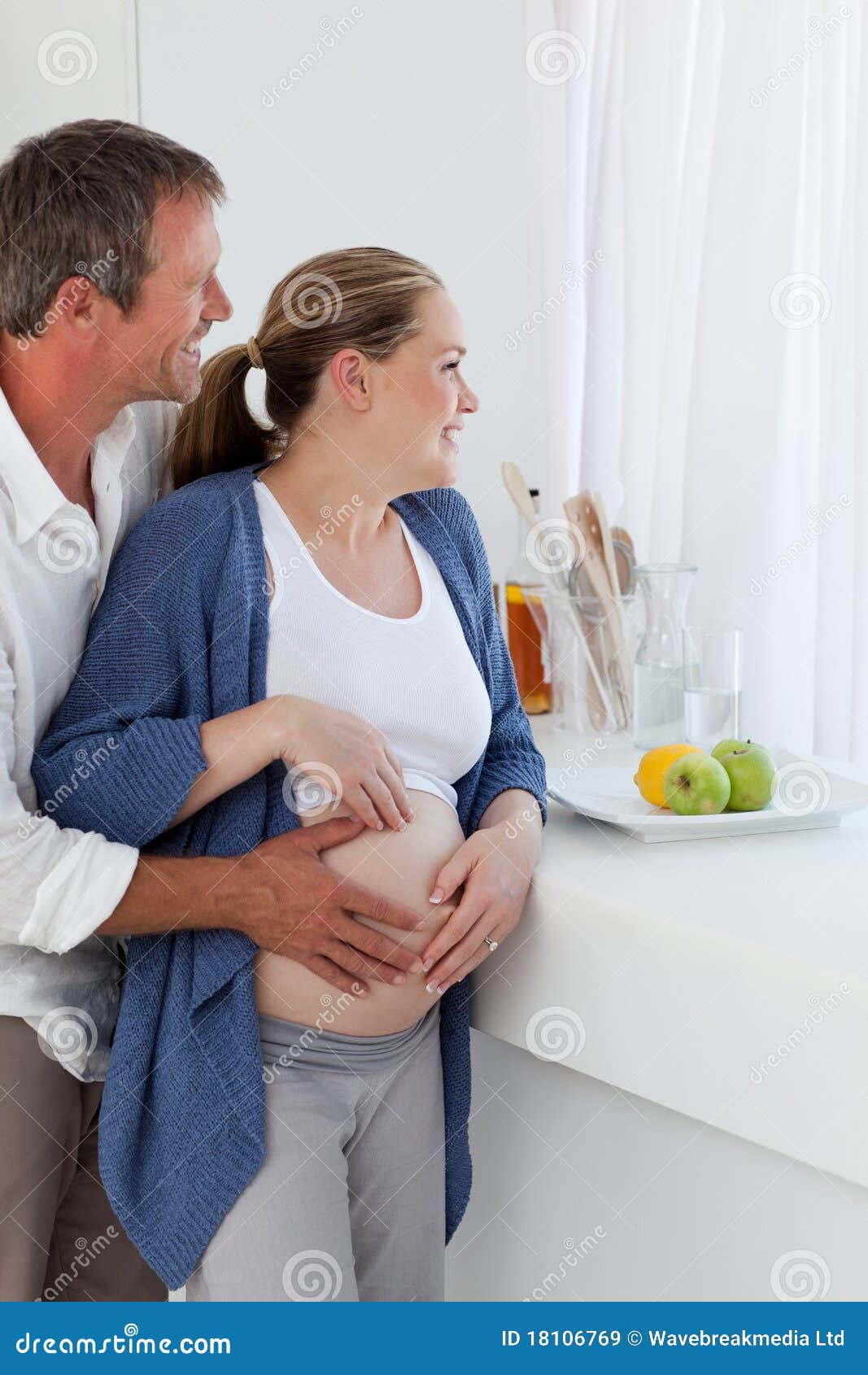 Couple Hugging in the Kitchen Stock Image - Image of definition ...