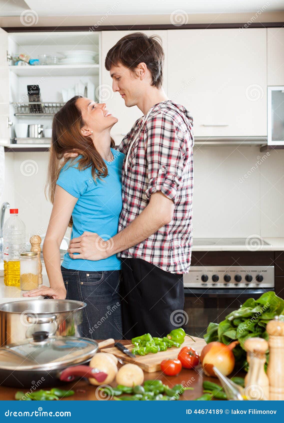 Couple Hugging In The Kitchen Stock Image Image Of Happiness