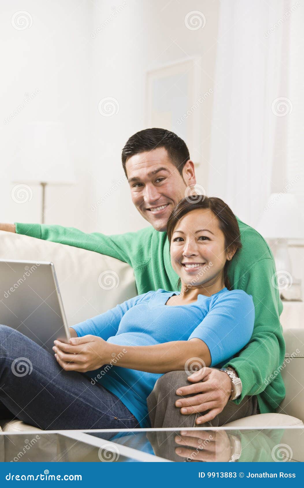 Couple Hugging with Laptop stock image. Image of couple - 9913883