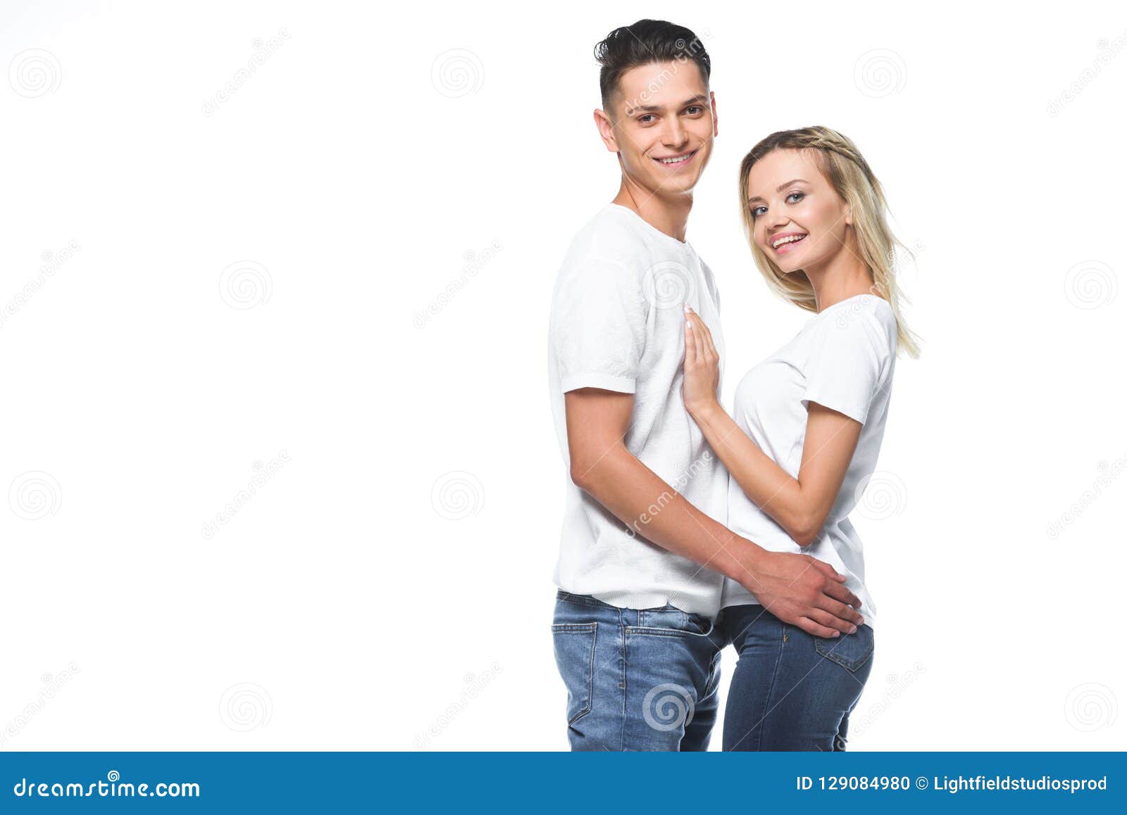 Couple Hugging and Looking at Camera Stock Photo - Image of ...