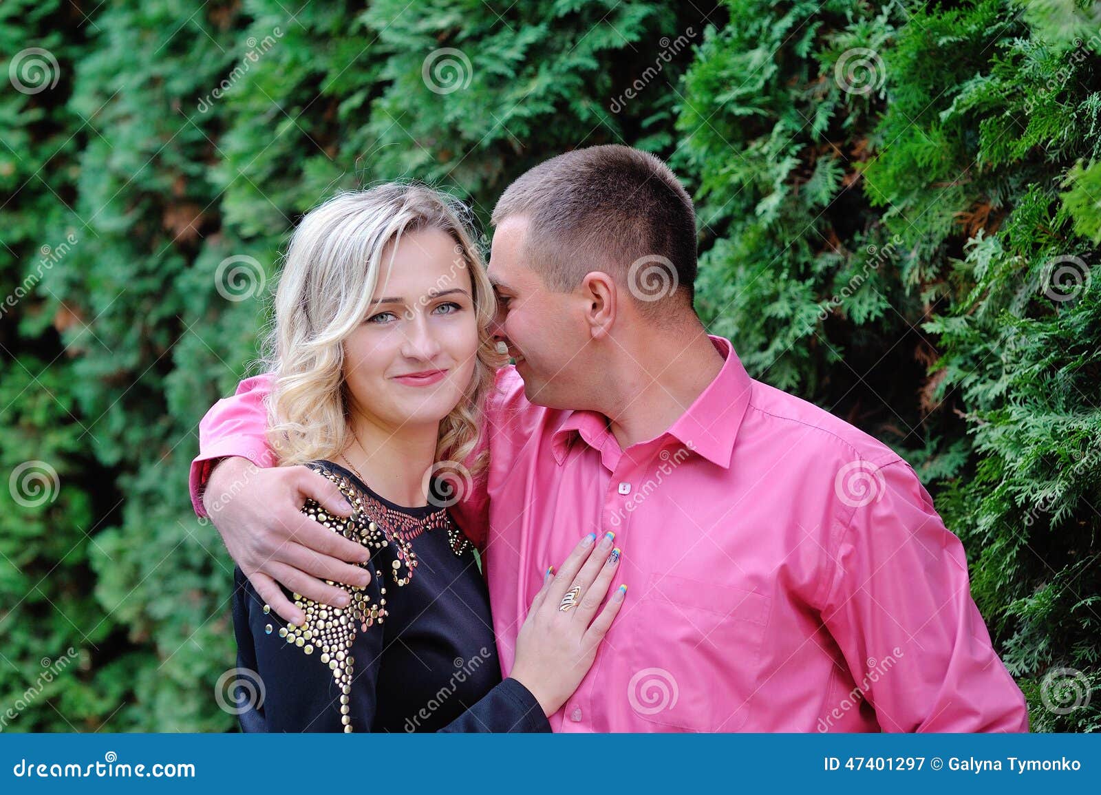 Couple Hugging in a Park Seated in a Bench Stock Image - Image of ...