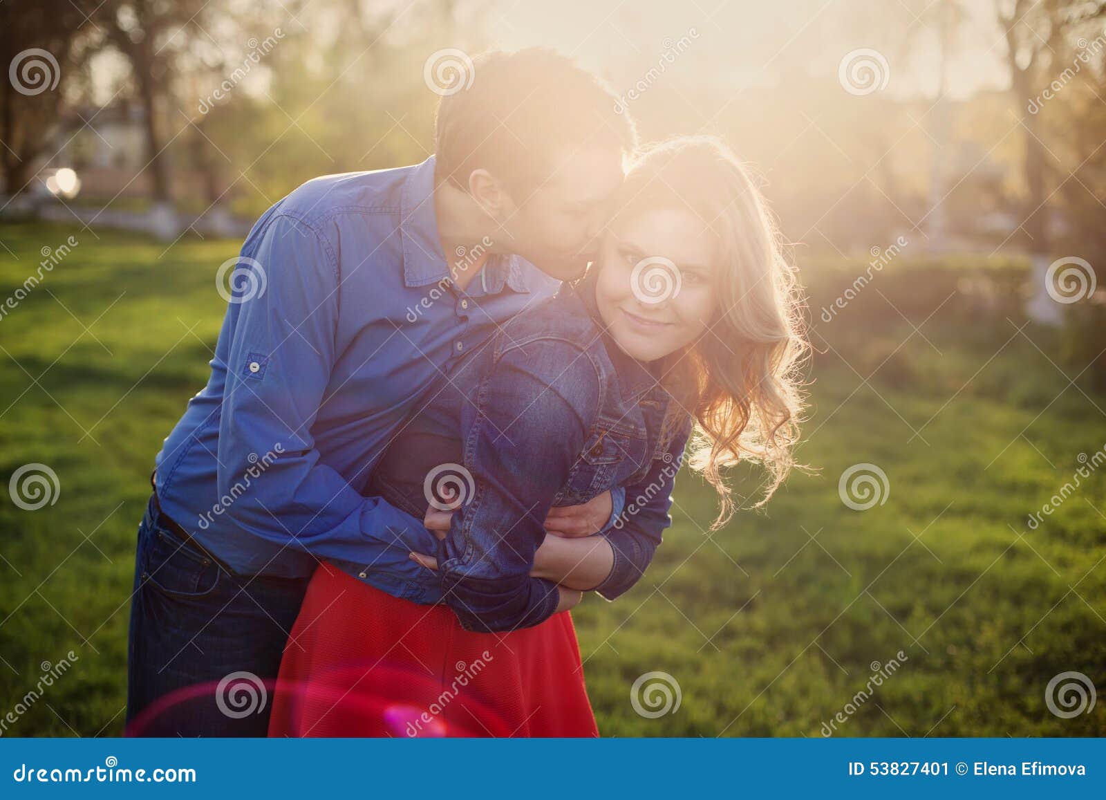 Couple Hugging in the Park at Sunset Stock Image - Image of female ...