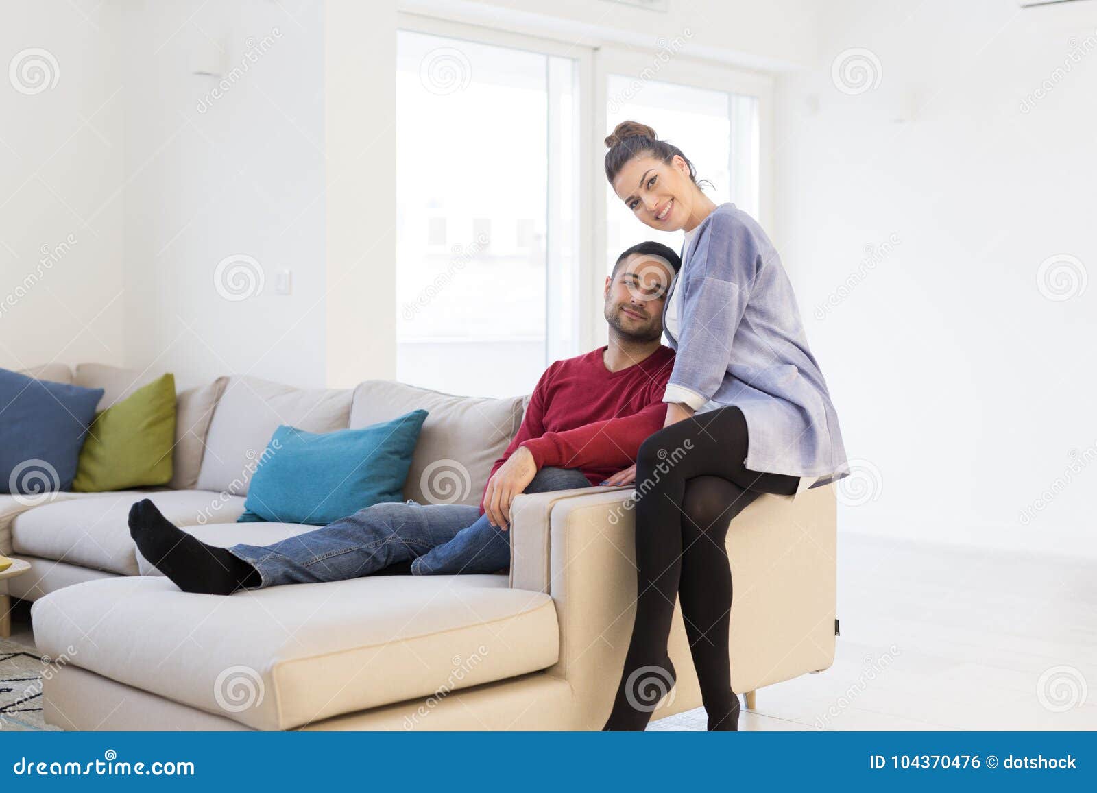 Couple Hugging and Relaxing on Sofa Stock Photo - Image of handsome ...