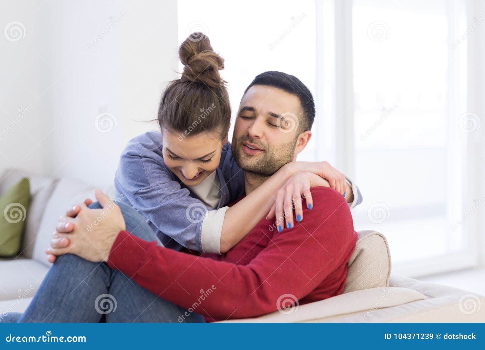 Couple Hugging and Relaxing on Sofa Stock Image - Image of female ...