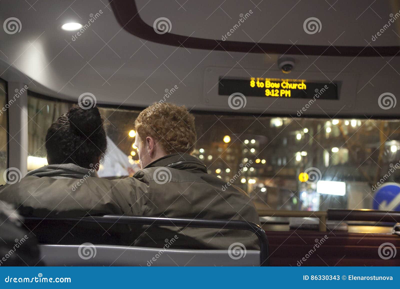 The Couple, Hugging, Sitting on the Bus in the Front Seat Editorial ...