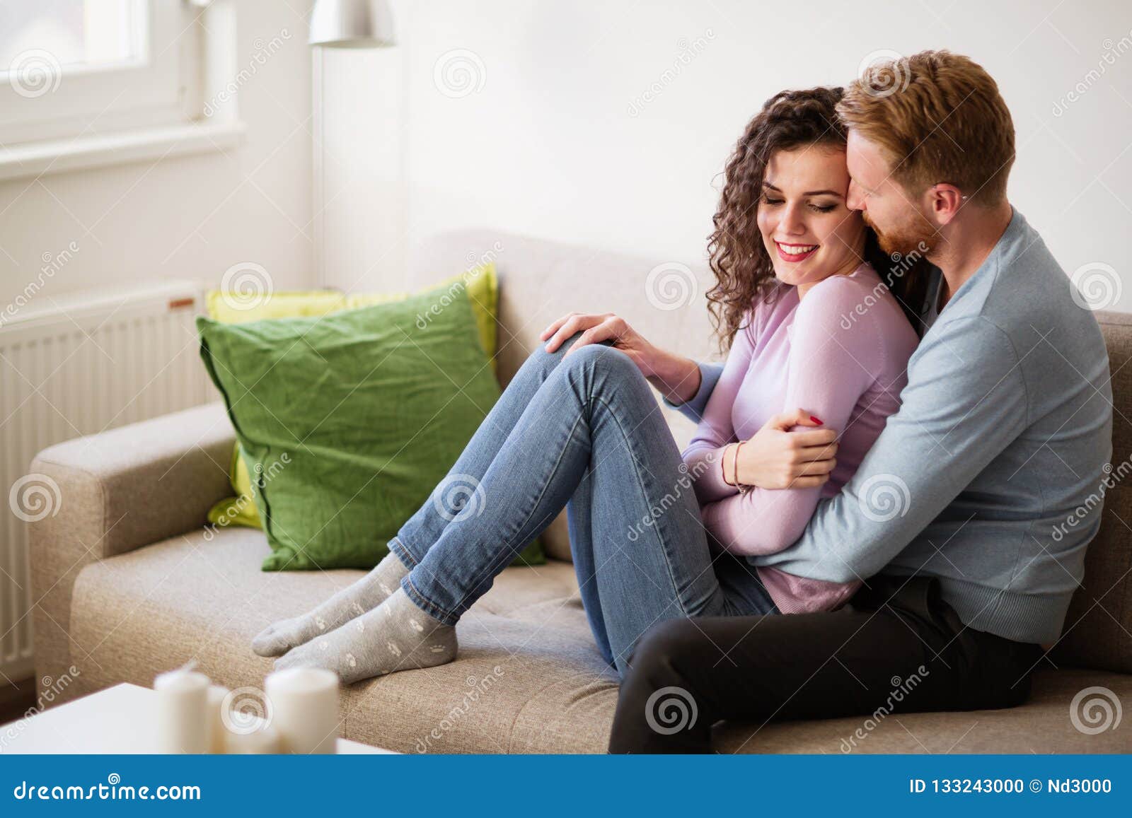 Couple Hugging and Smiling at Home Stock Photo - Image of loving, male ...