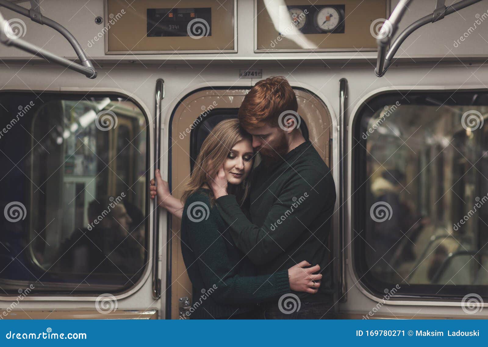 Couple hugging in subway stock image. Image of attractive - 169780271