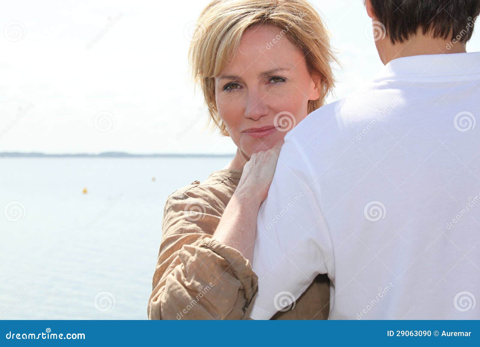 Couple Hugging by the Water Stock Photo - Image of woman, 3539: 29063090