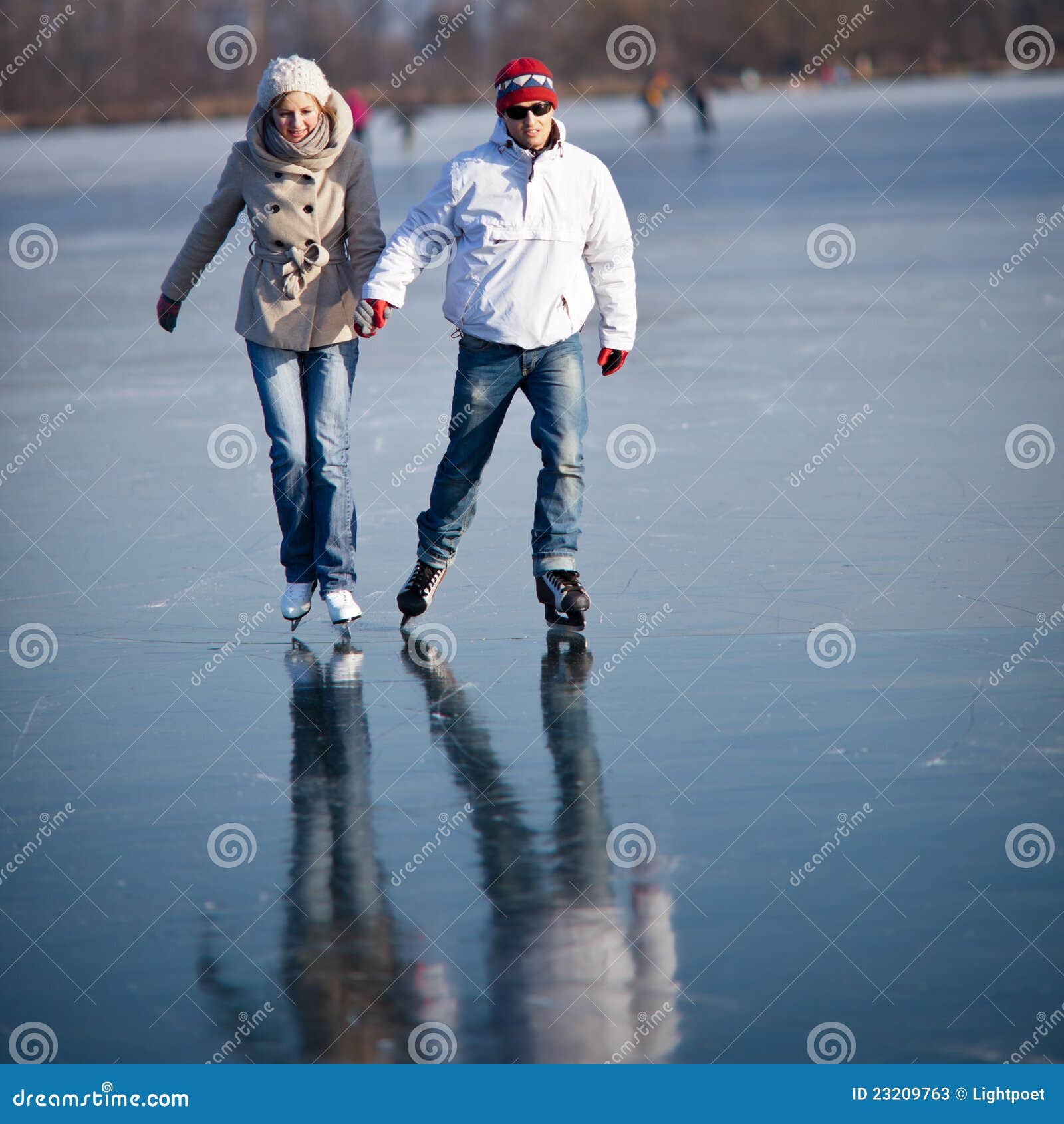 Couple Ice Skating on a Pond Stock Image - Image of exercise, fitness ...