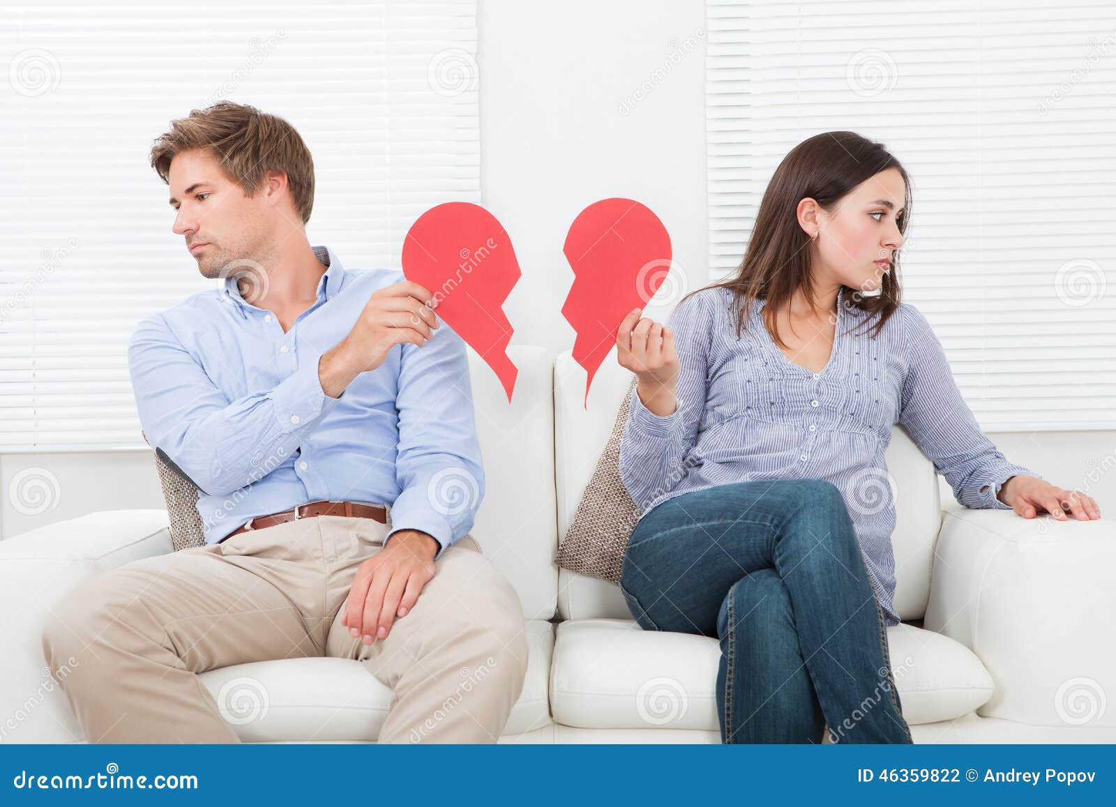 Couple Ignoring Each Other on Sofa Stock Photo - Image of ignore ...