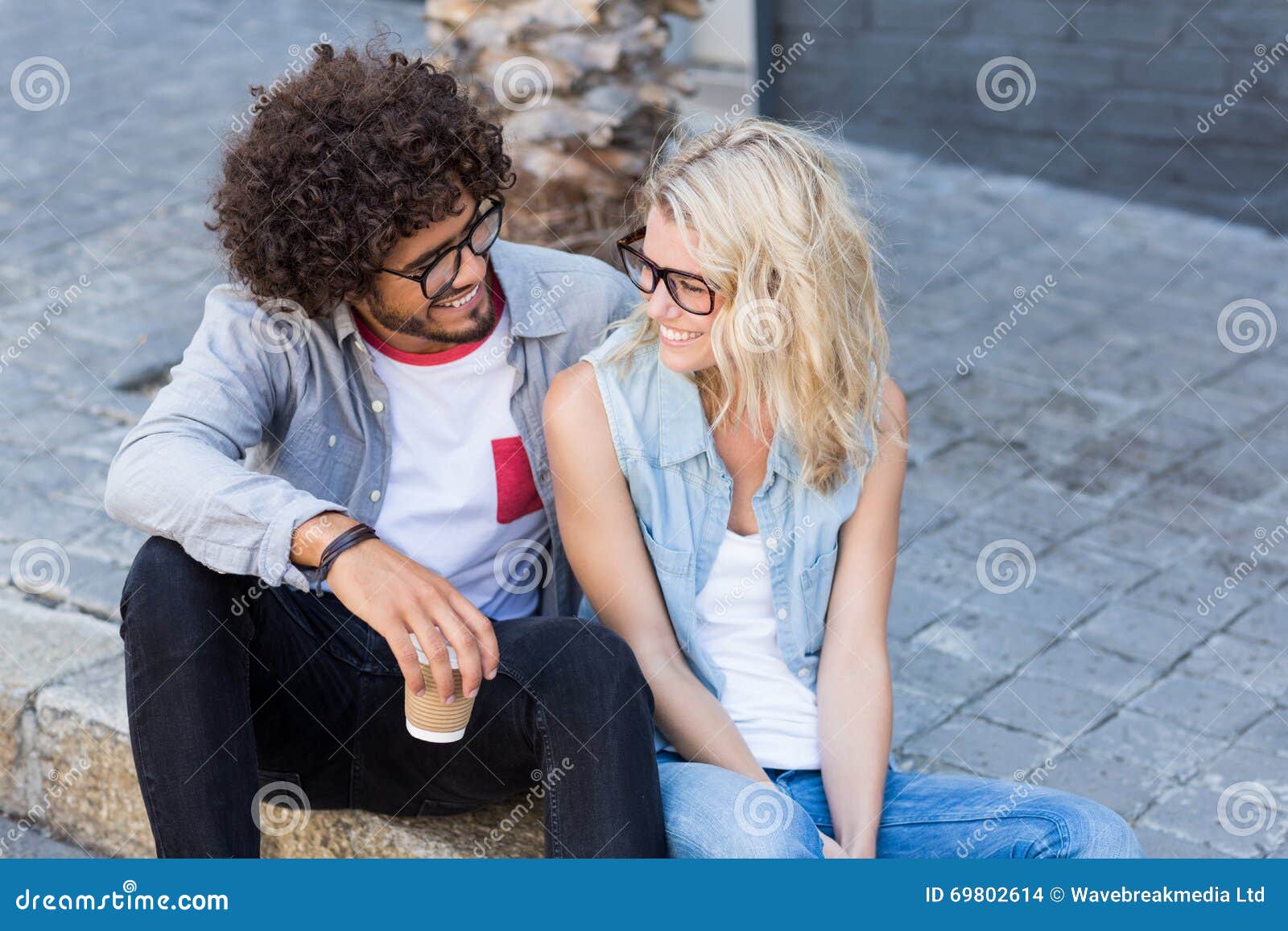 Couple Interacting with Each Other Stock Photo - Image of footpath ...