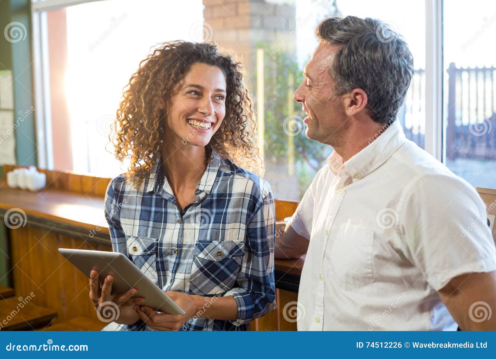 Couple Interacting with Each Other in Supermarket Stock Photo - Image ...