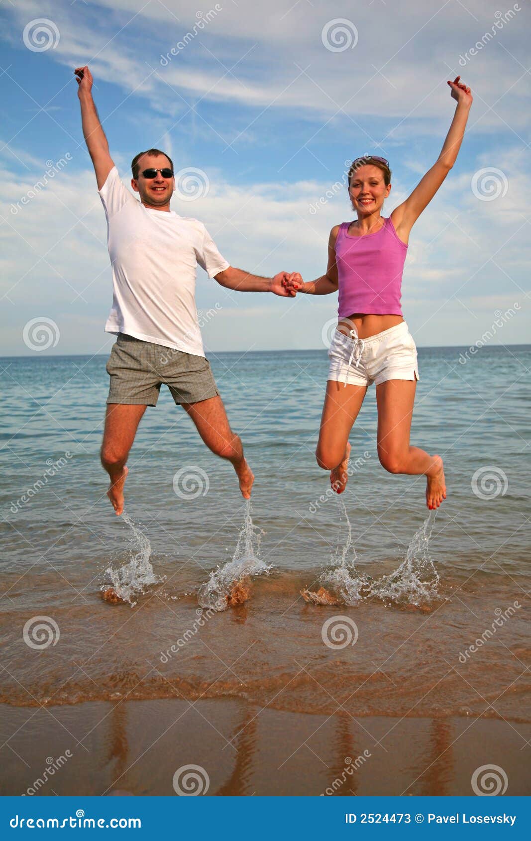 Couple jump stock image. Image of gravity, coastline, people - 2524473