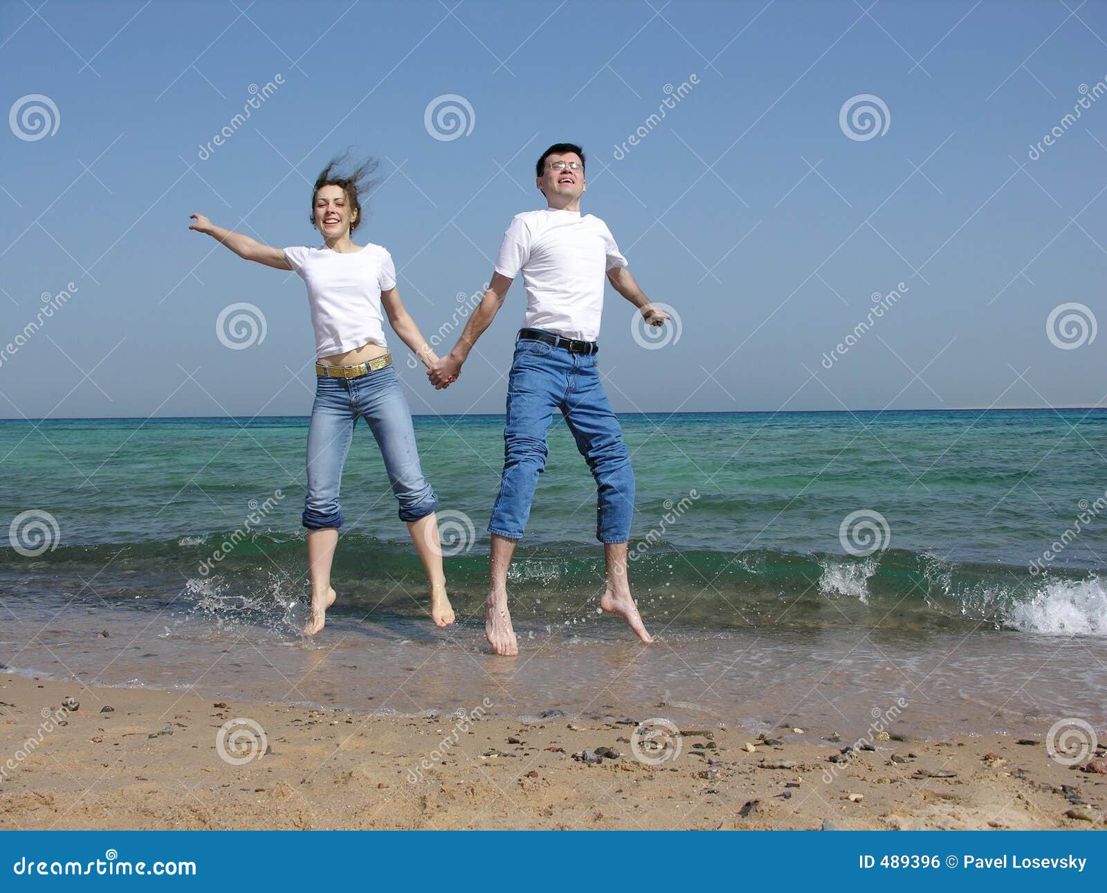 Couple jump. sea stock photo. Image of face, couple, adult - 489396