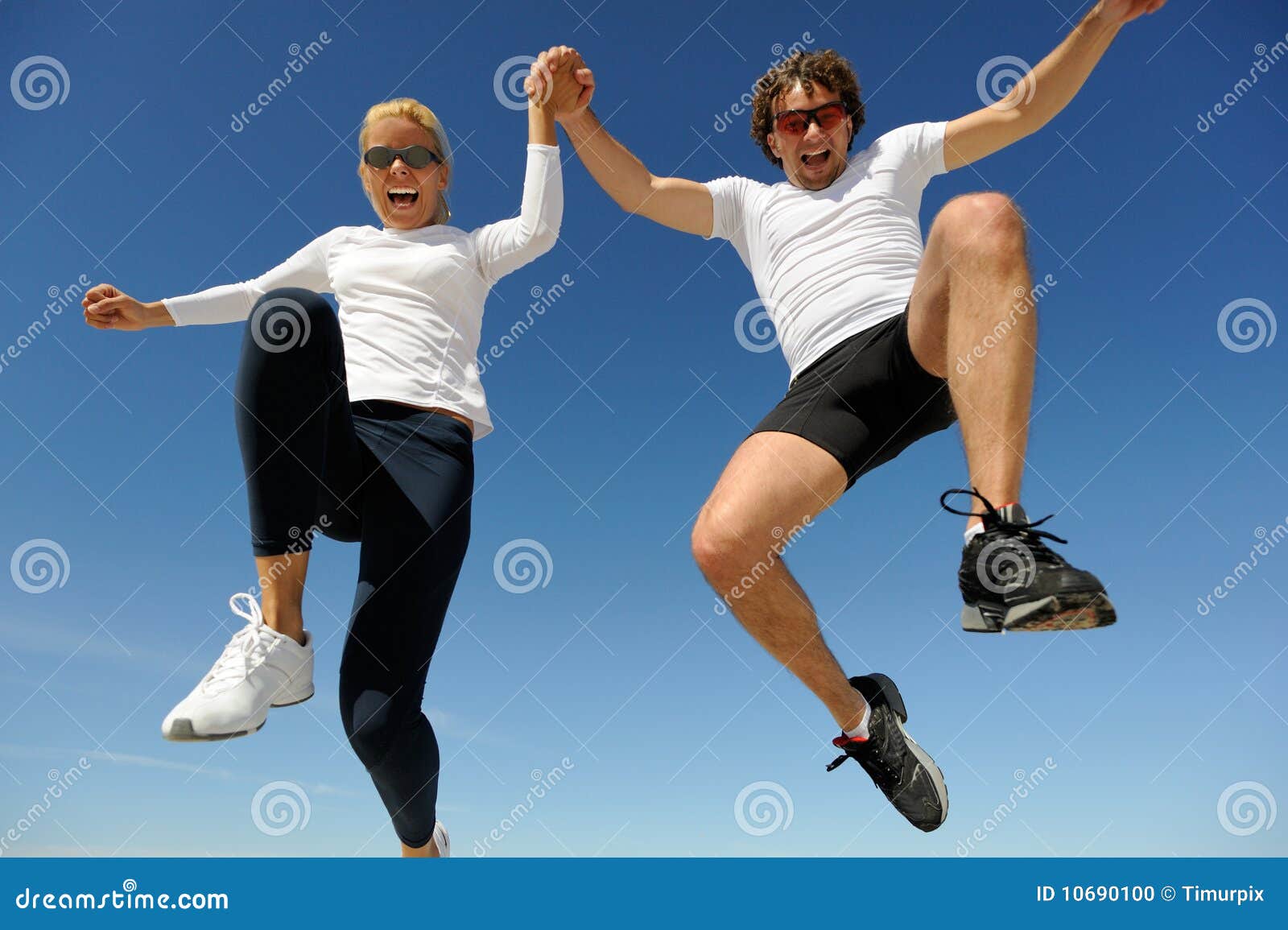 Couple jumping stock photo. Image of fitness, freedom - 10690100