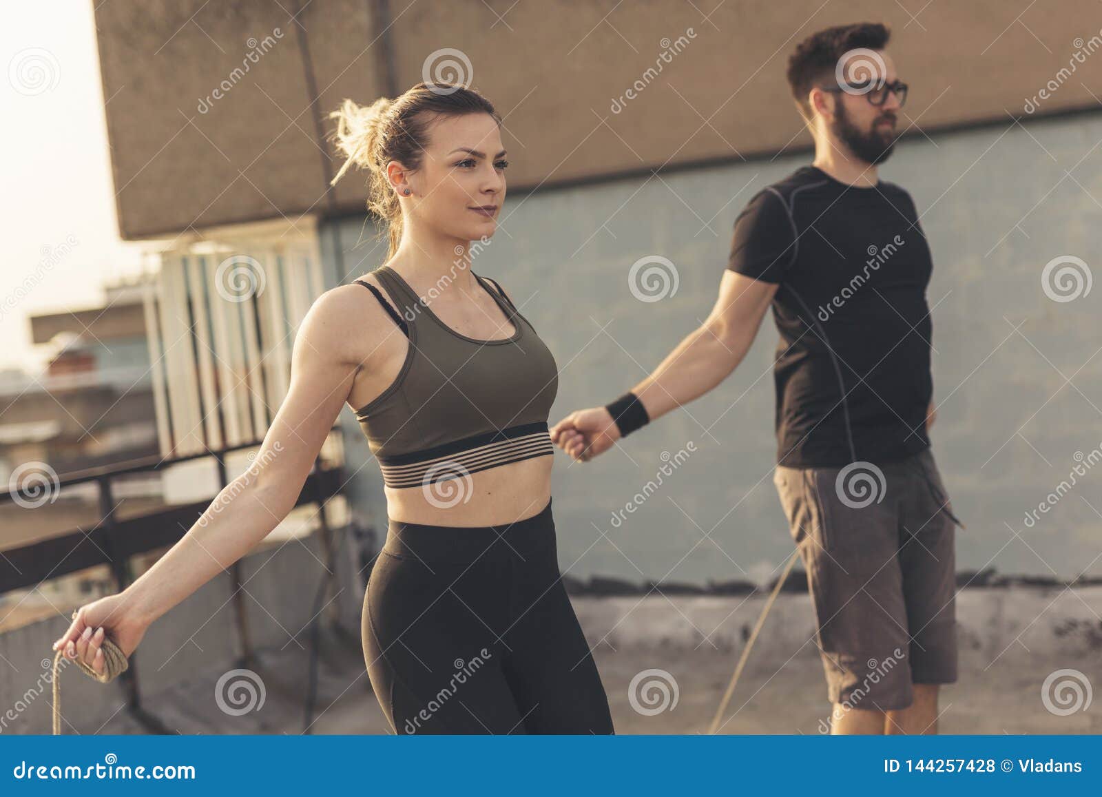 Couple jumping ropes stock photo. Image of person, lose - 144257428