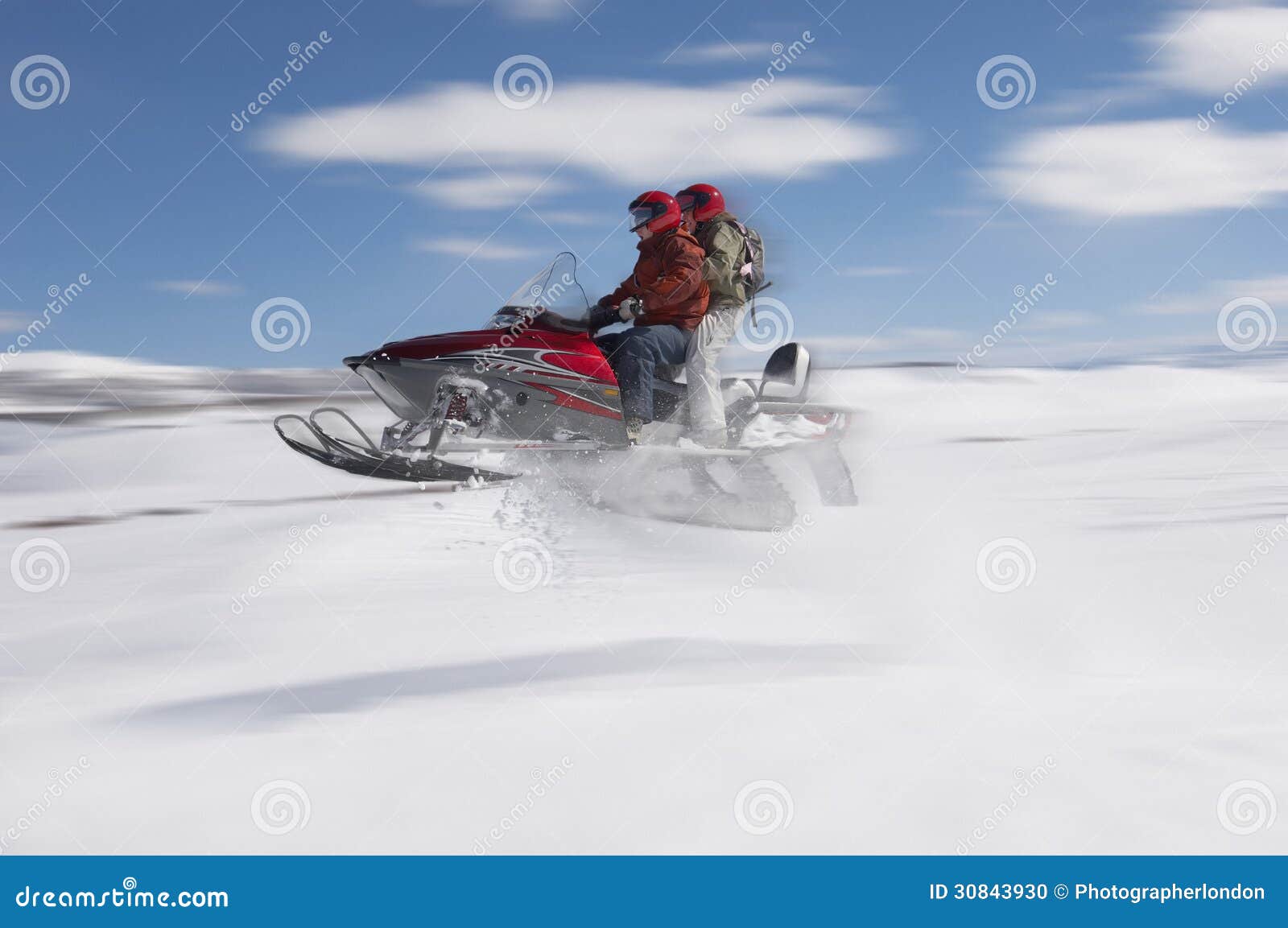 Couple Jumping Snowmobile in Snow Stock Photo - Image of motion, remote ...