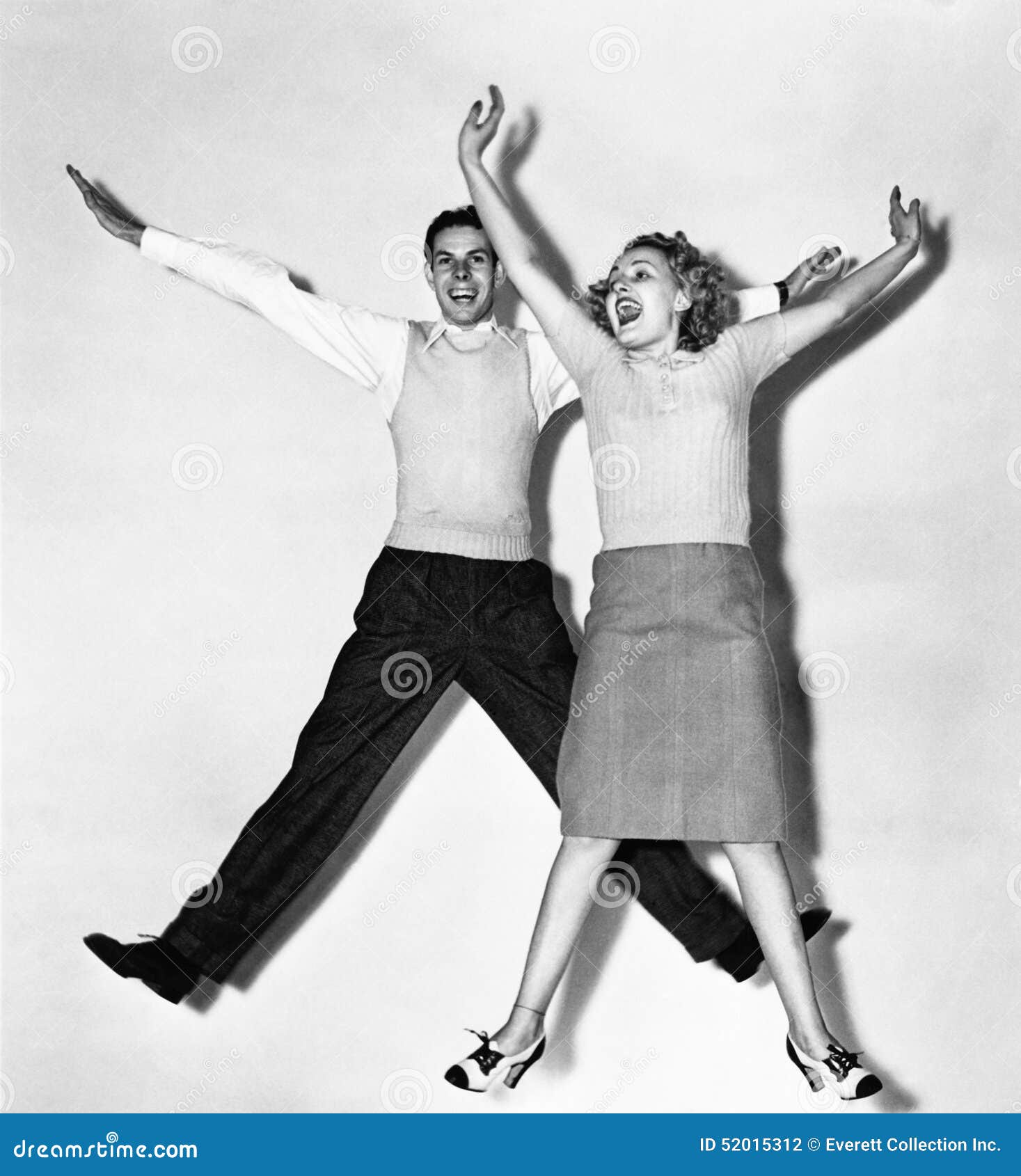 Couple Jumping with Their Arms Outstretched Stock Photo - Image of 2025 ...